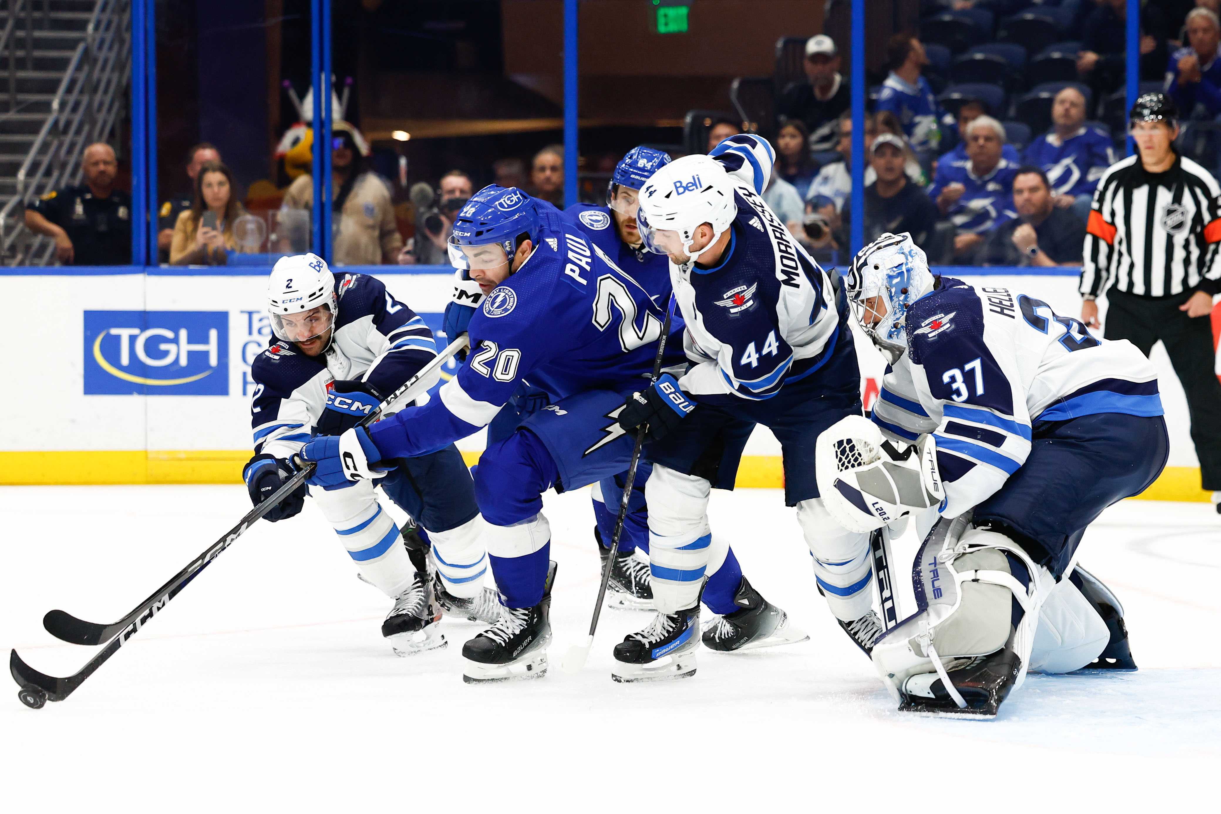 Adam Lowry leads Jets past Lightning in overtime | Reuters