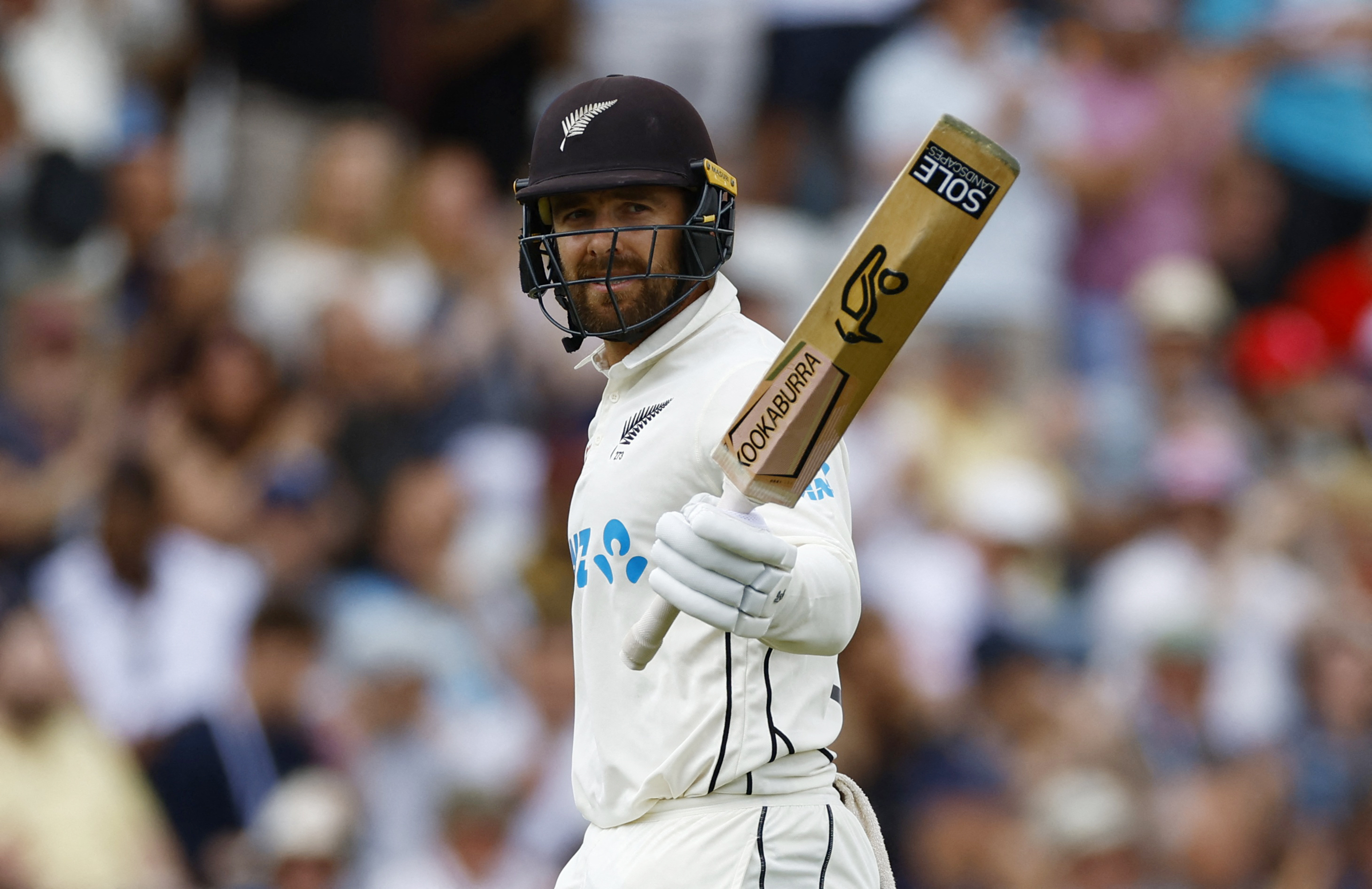 Mitchell ton helps New Zealand to huge total in second test | Reuters