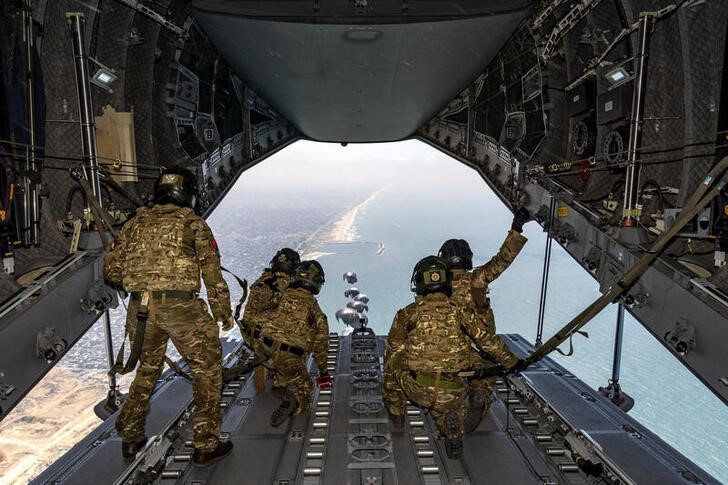 UK to boost armed forces given threat from 'deadly quartet' | Reuters