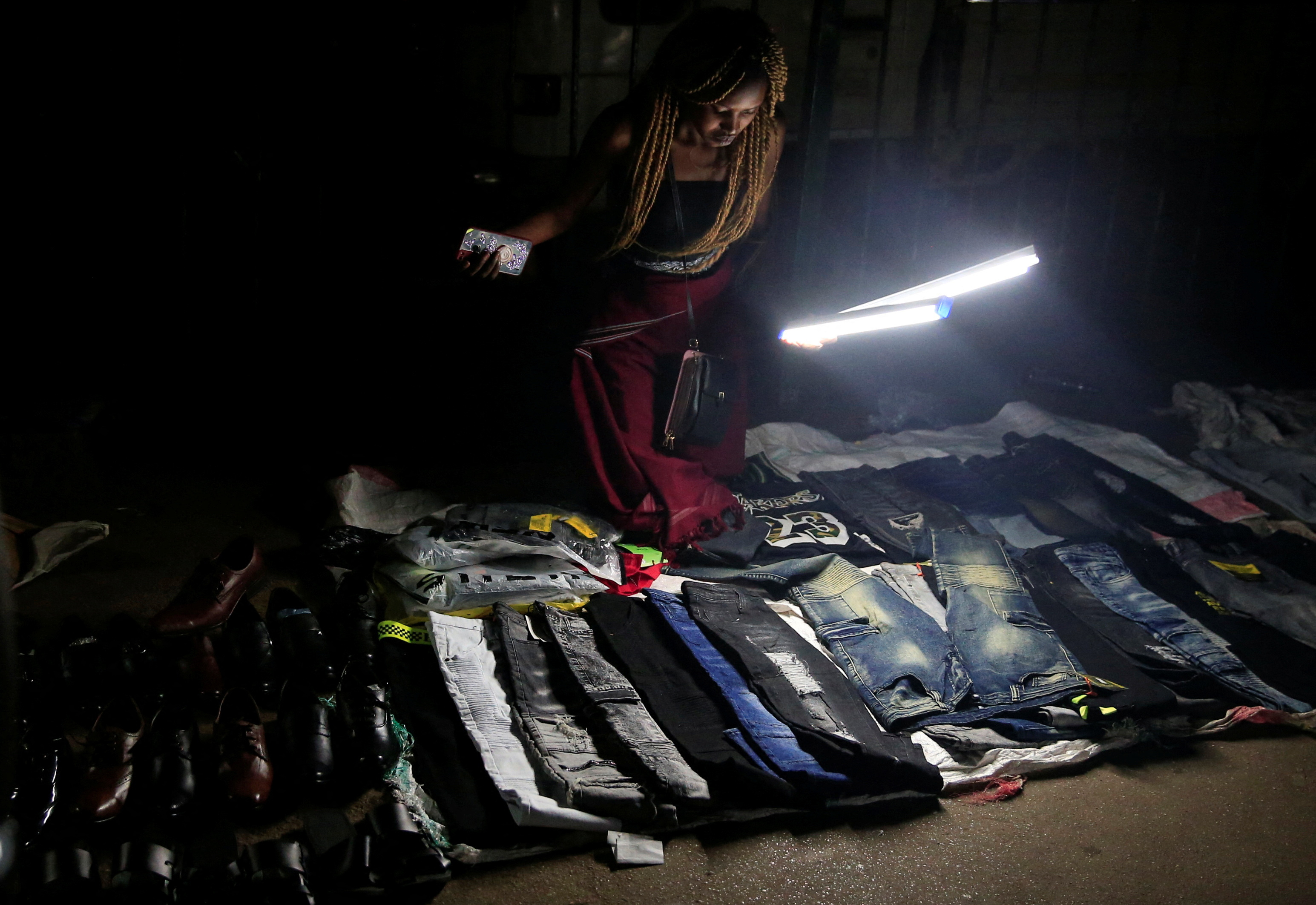Zimbabwe's night markets cushion crisis-weary citizens from inflation ...