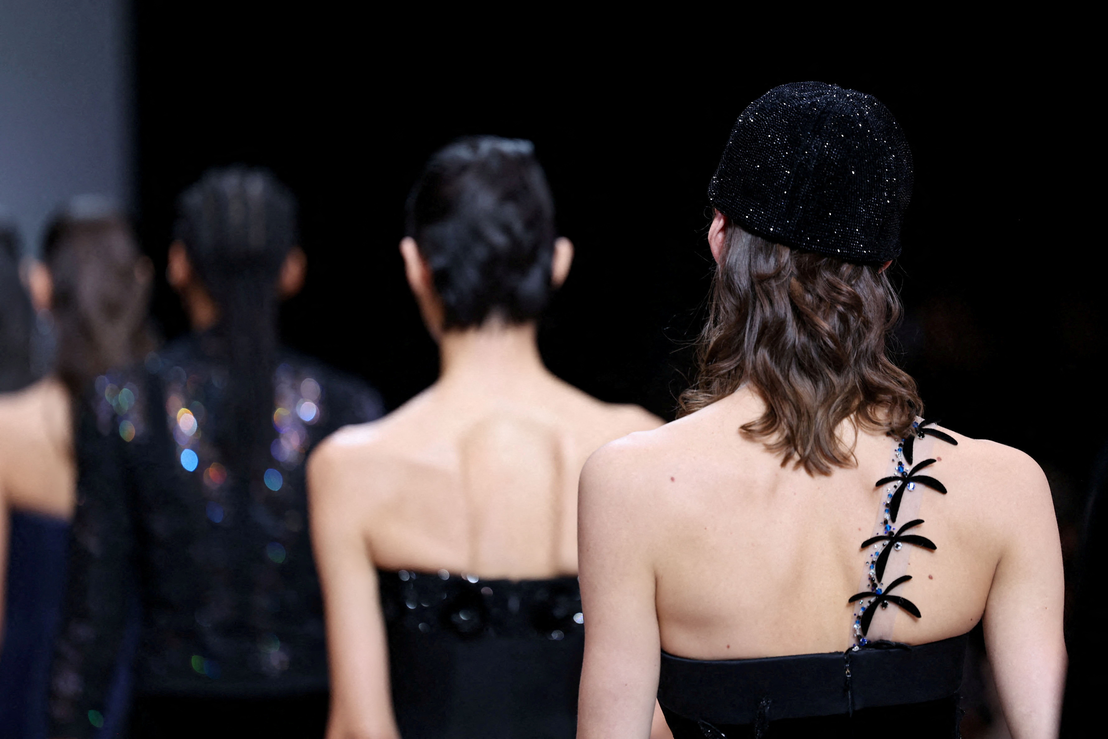 Giorgio Armani catwalk blooms with florals at Milan Fashion Week | Reuters