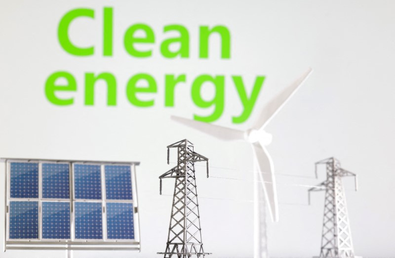 Investors exit clean energy funds as higher interest rates bite | Reuters