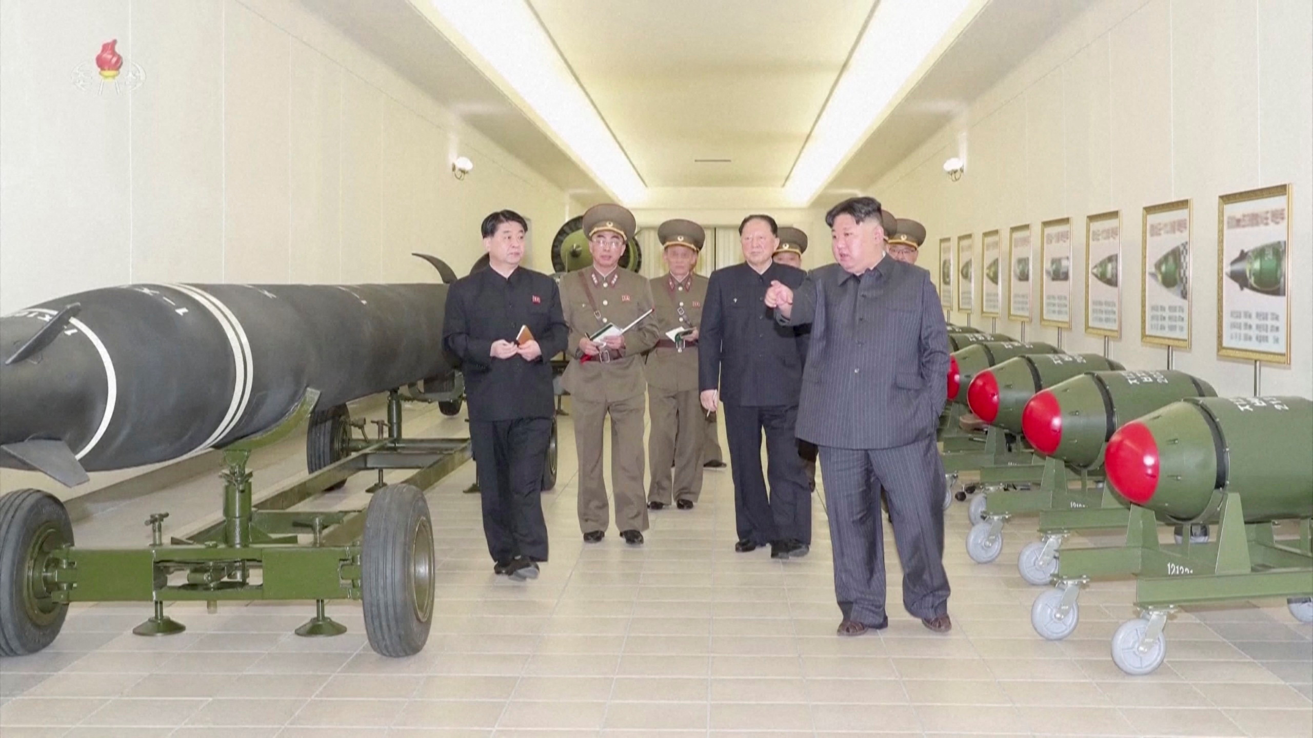 North Korea unveils new nuclear warheads as US air carrier arrives in ...