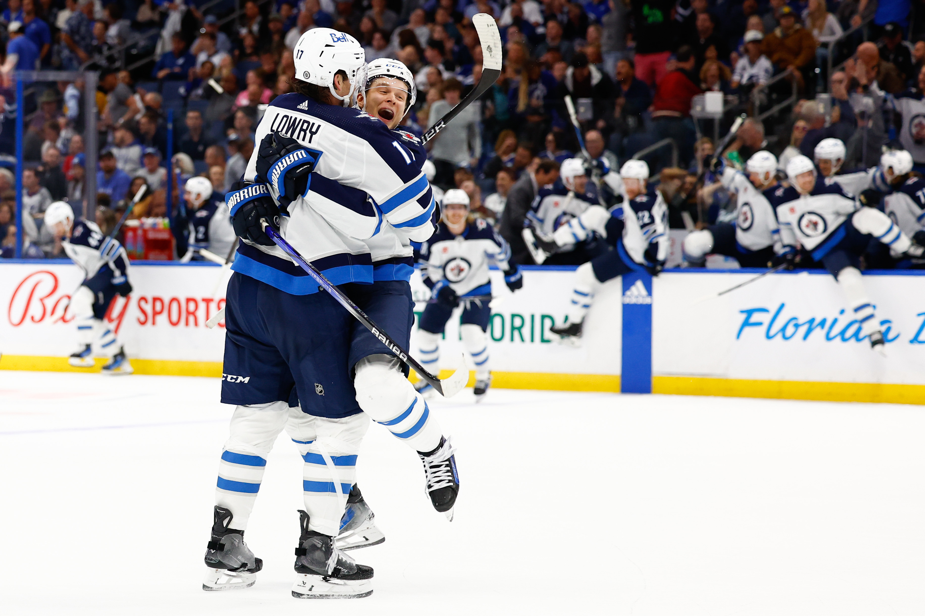 Adam Lowry leads Jets past Lightning in overtime | Reuters