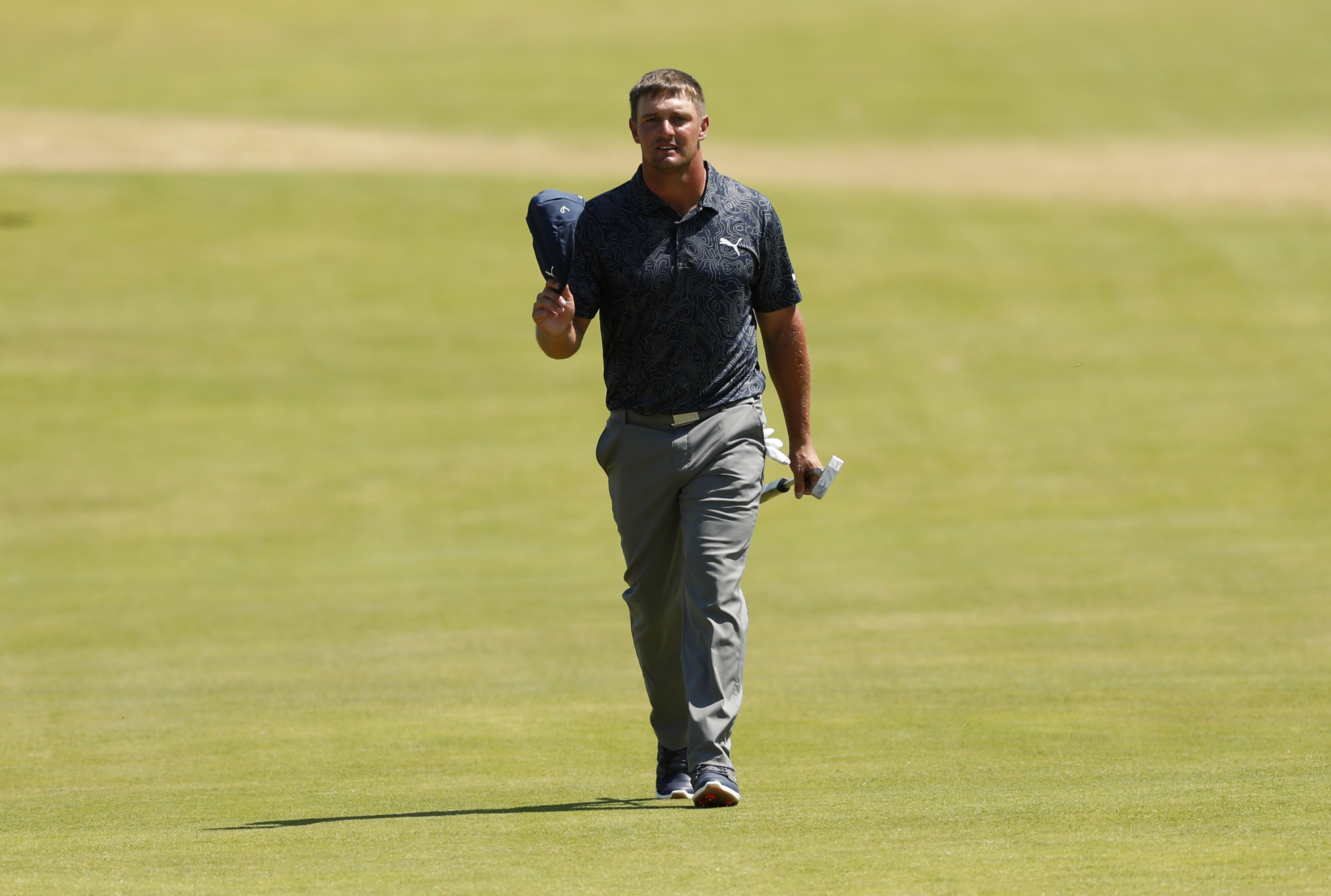 Golf-World number one Rahm, DeChambeau test positive for COVID-19 | Reuters