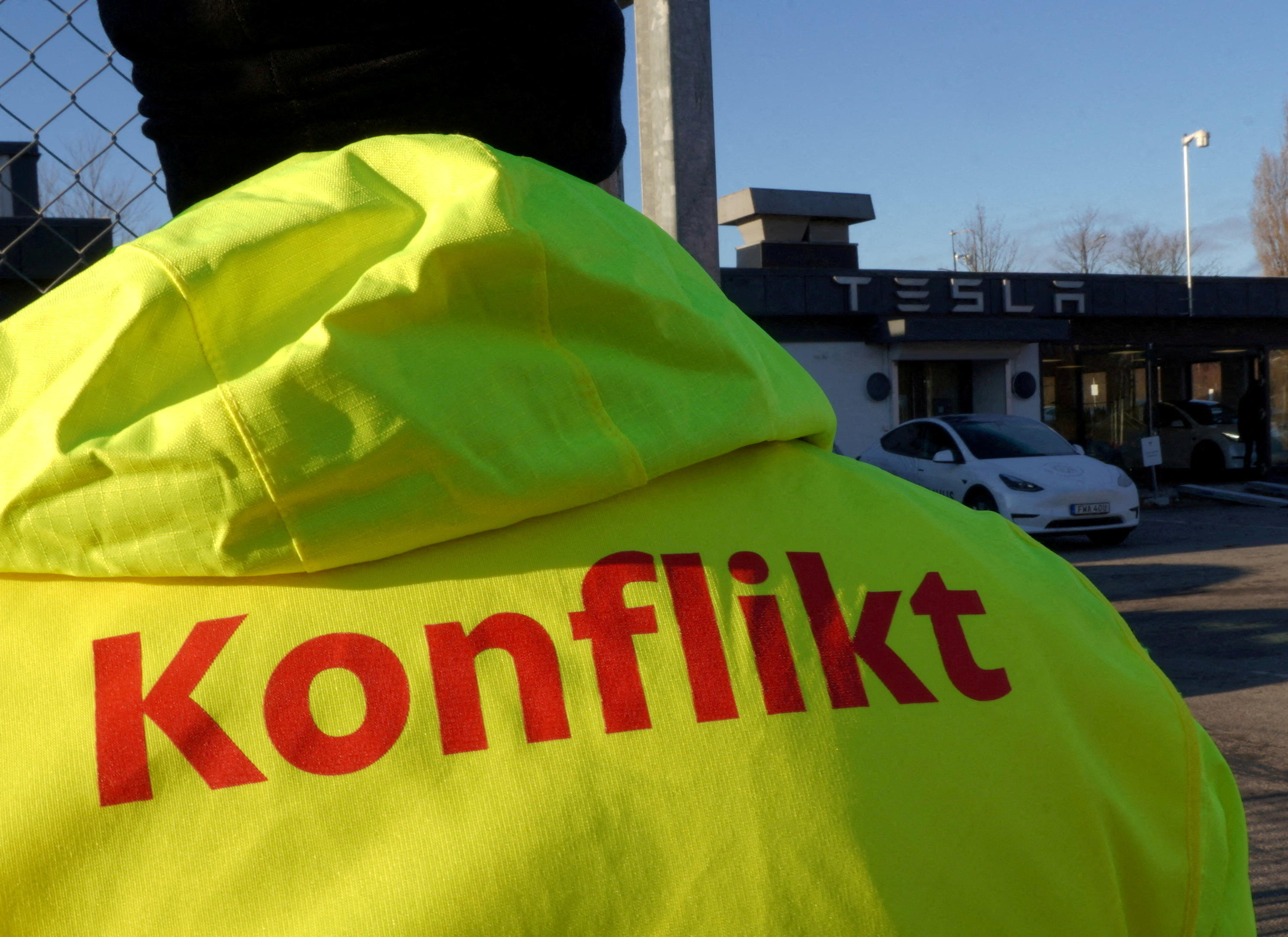 Swedish union files lawsuit against Tesla over labour conflict | Reuters
