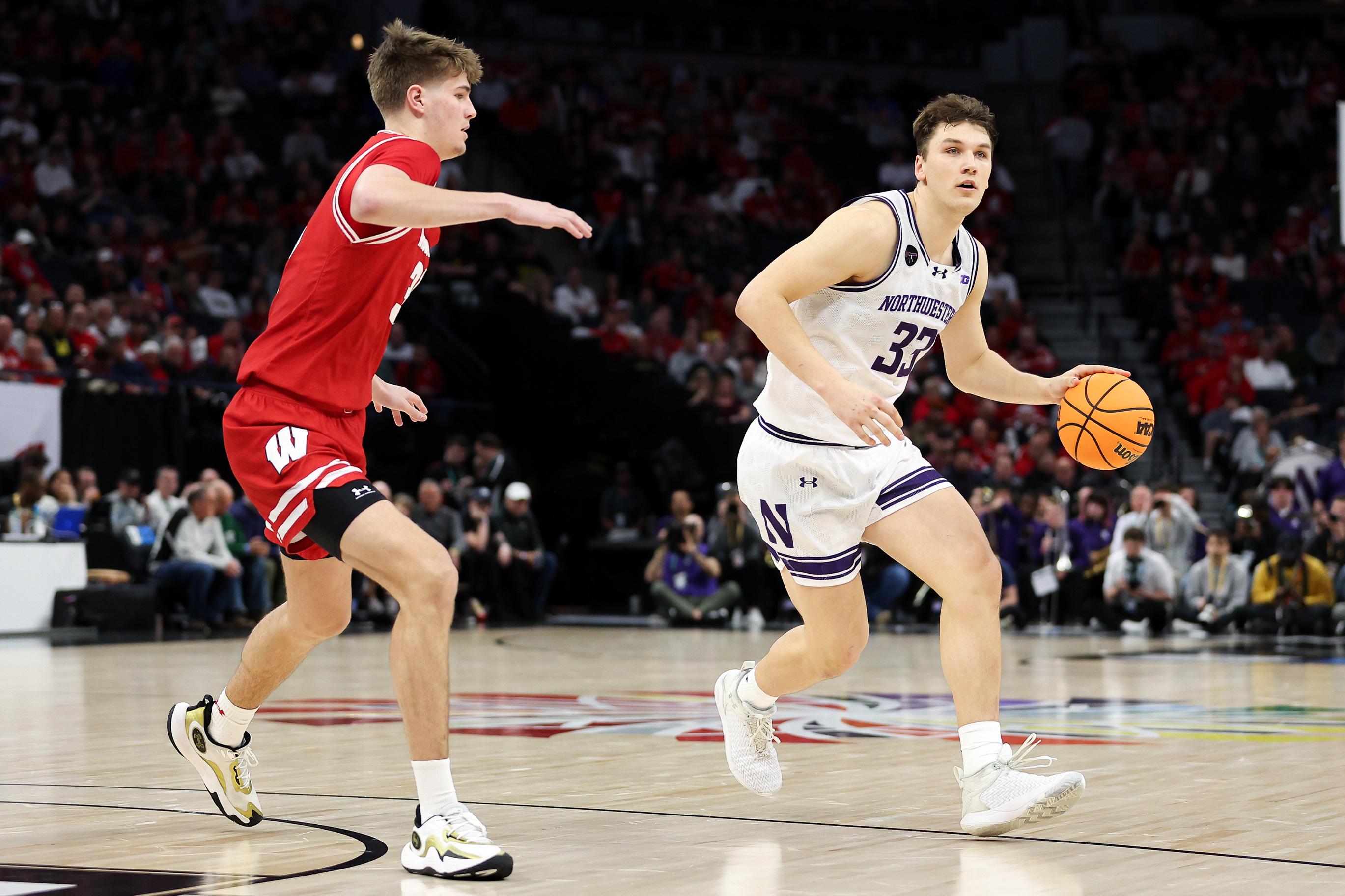 AJ Storr paces Wisconsin past Northwestern and into Big Ten semis | Reuters