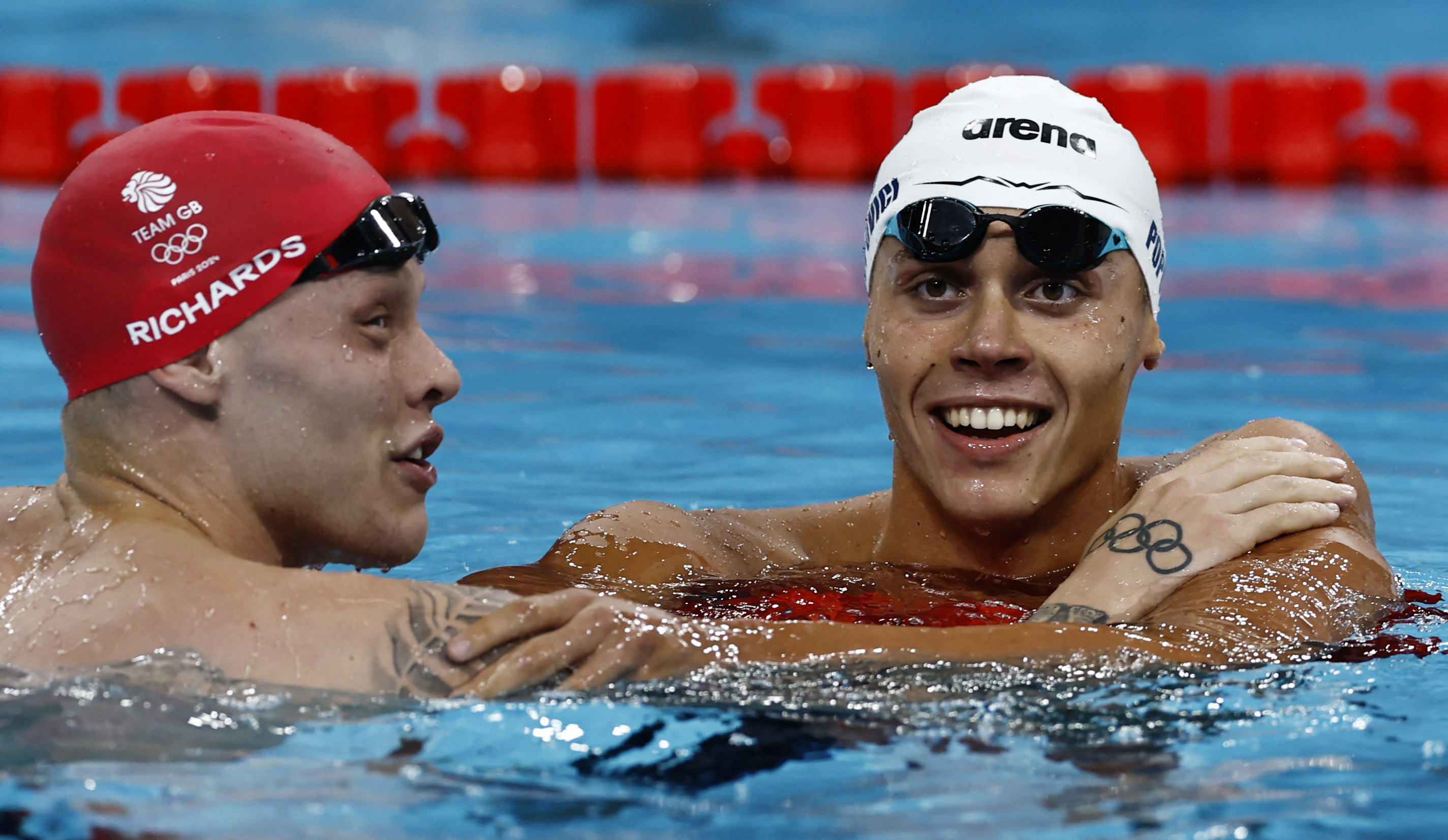 Swimming-Popovici takes men's 200 metres freestyle gold | Reuters