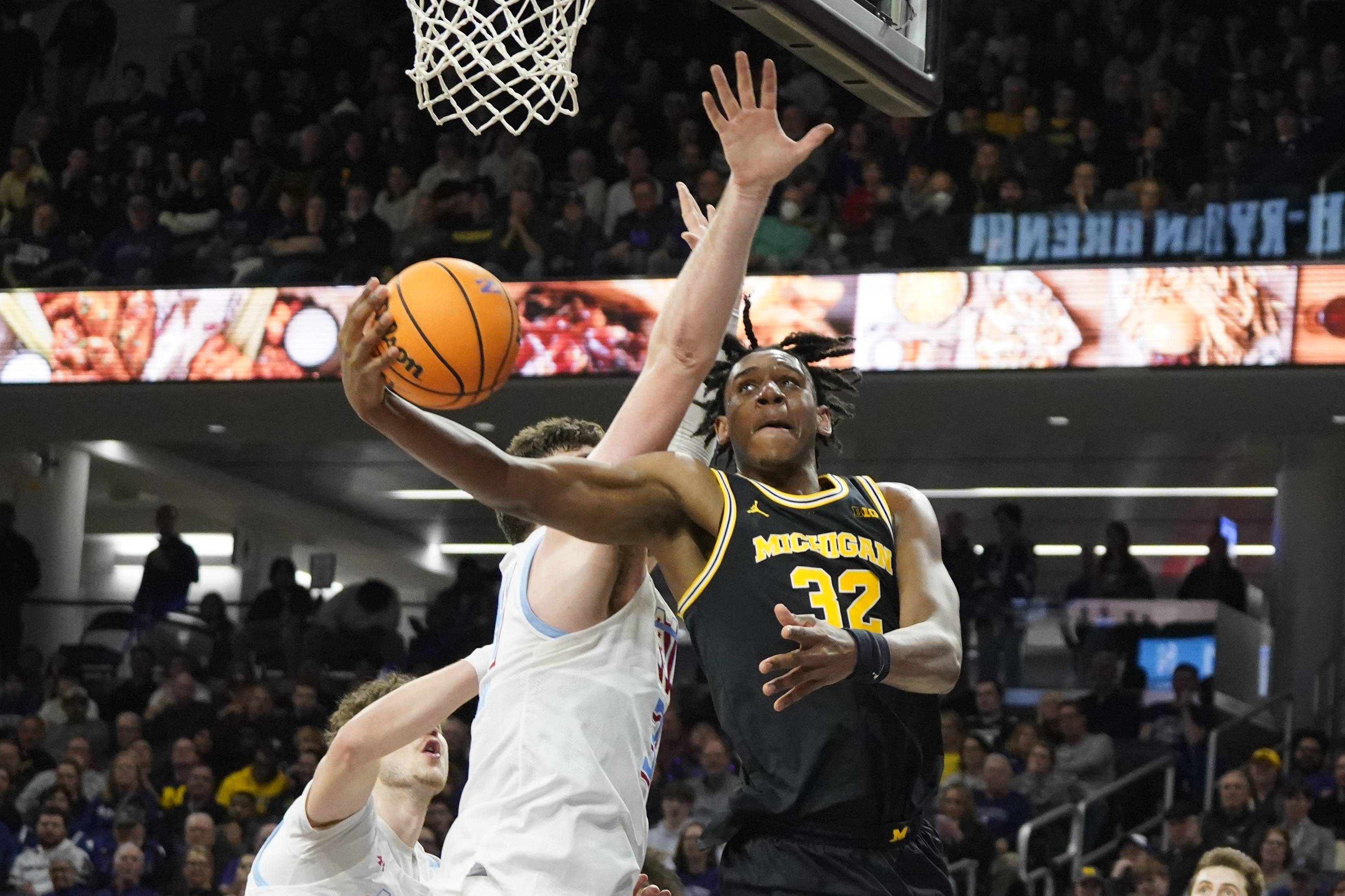 Boo Buie gets record, Northwestern gets win over Michigan | Reuters