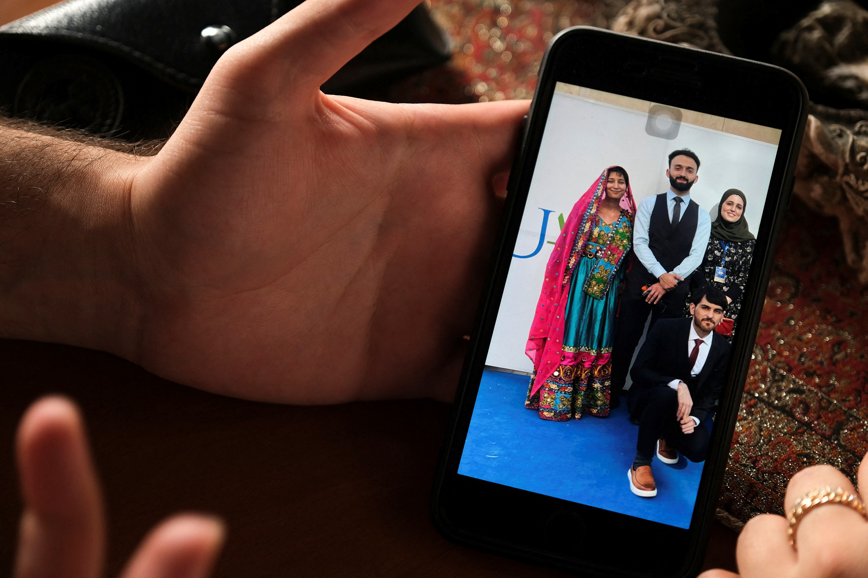 Afghan students graduate in Iraq after Taliban takeover | Reuters