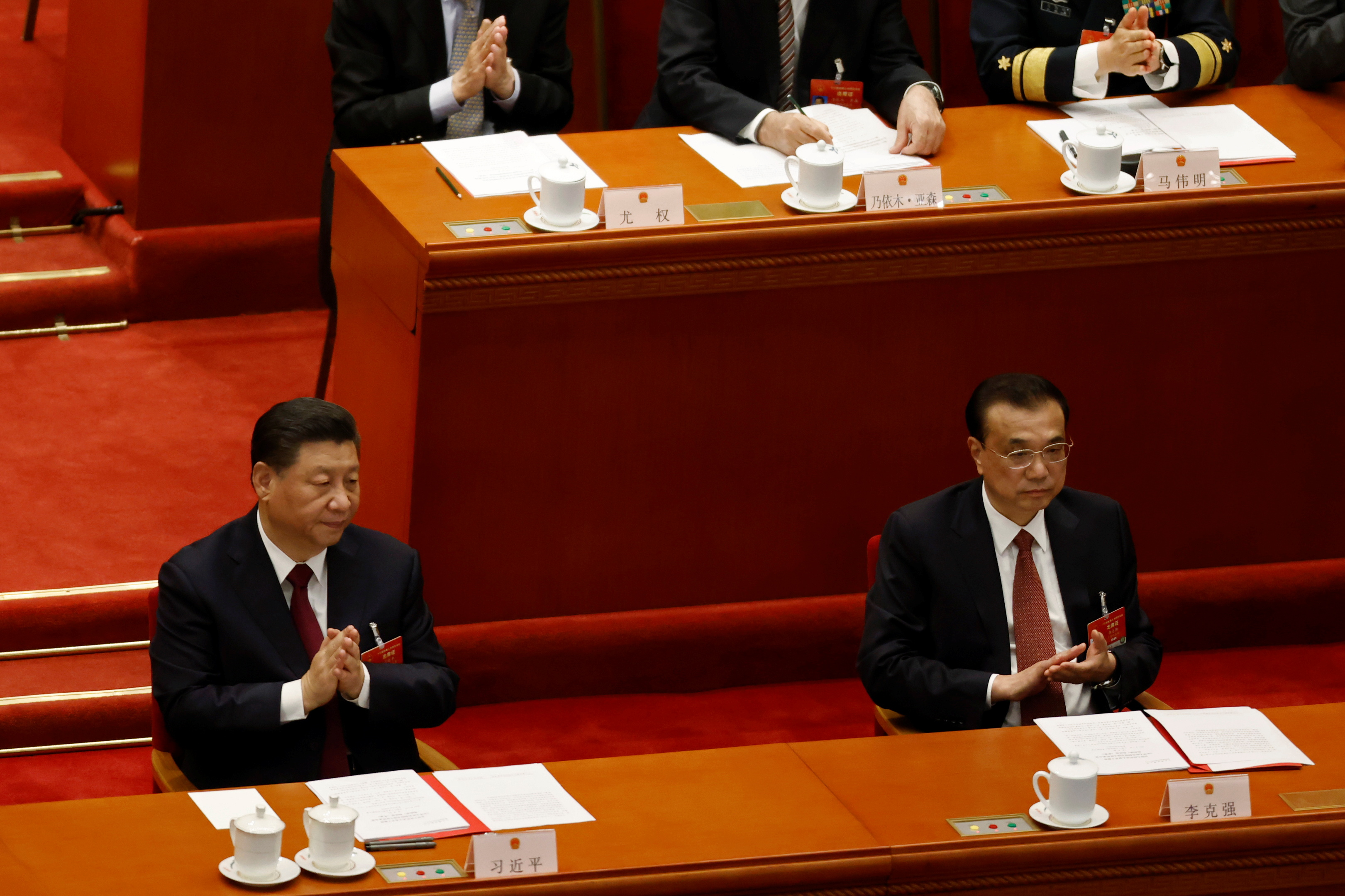 China’s parliament moves to overhaul Hong Kong’s electoral system | Reuters