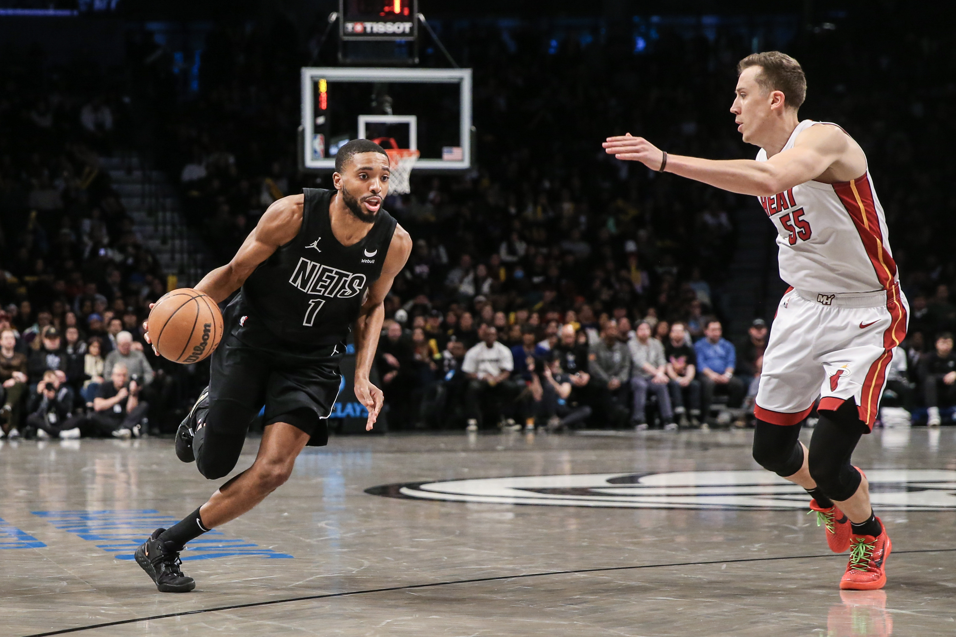 Jimmy Butler returns to guide Heat past Nets in OT | Reuters