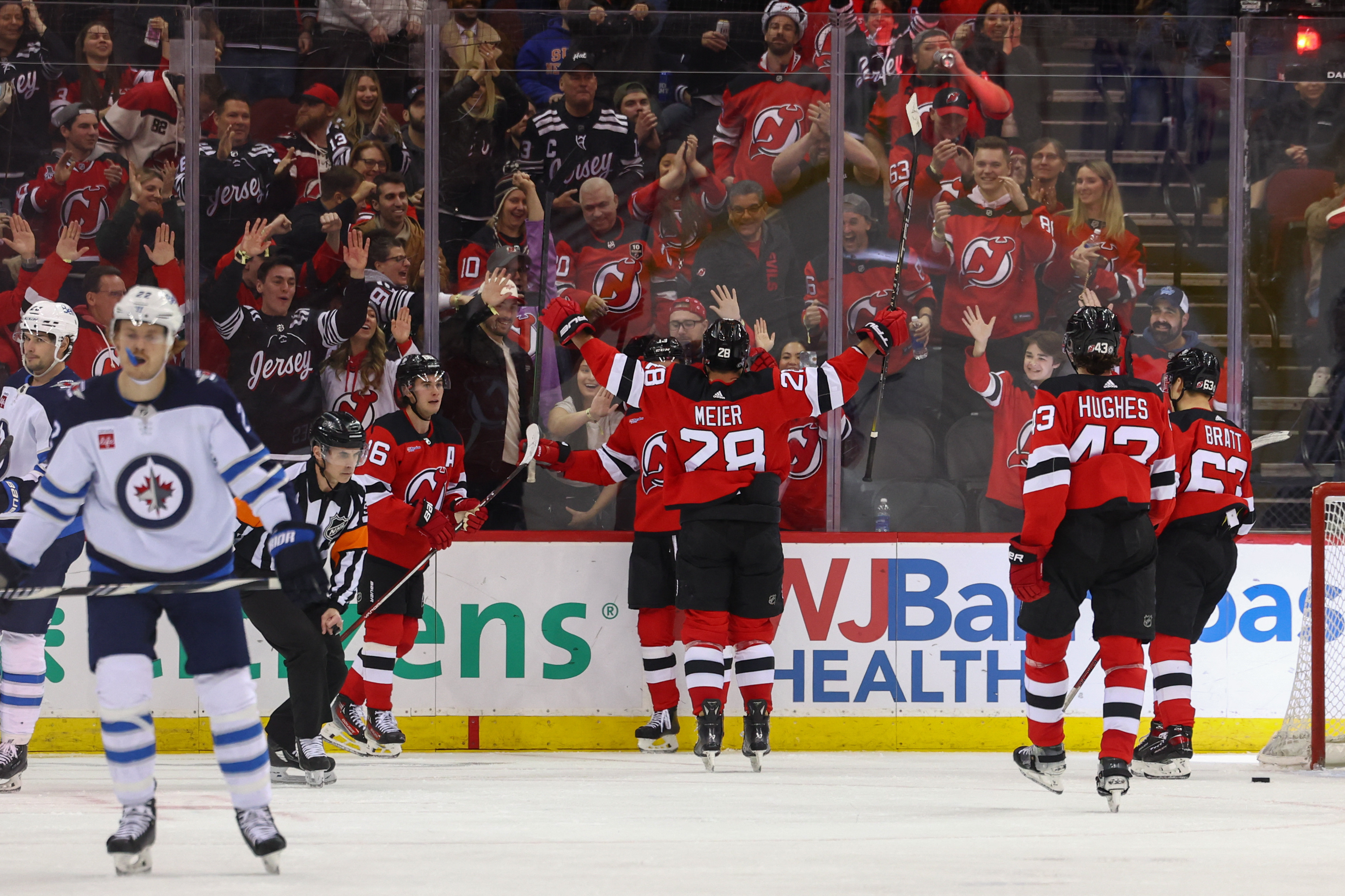 Devils net three power-play goals, dump Jets | Reuters