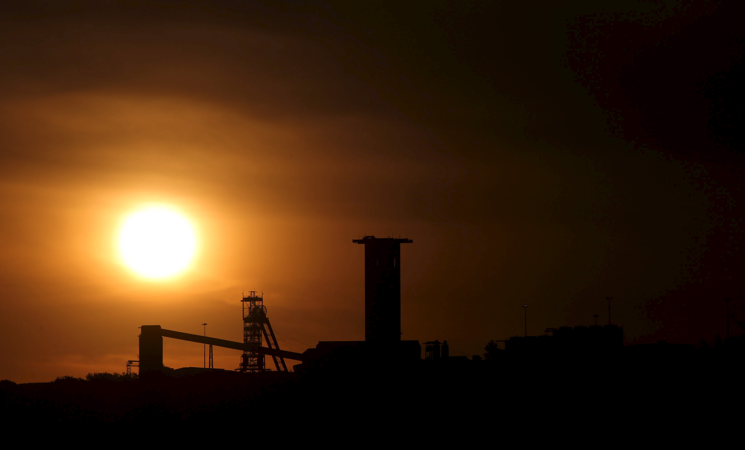 Explainer: Why South Africa's two biggest gold miners differ on wages ...