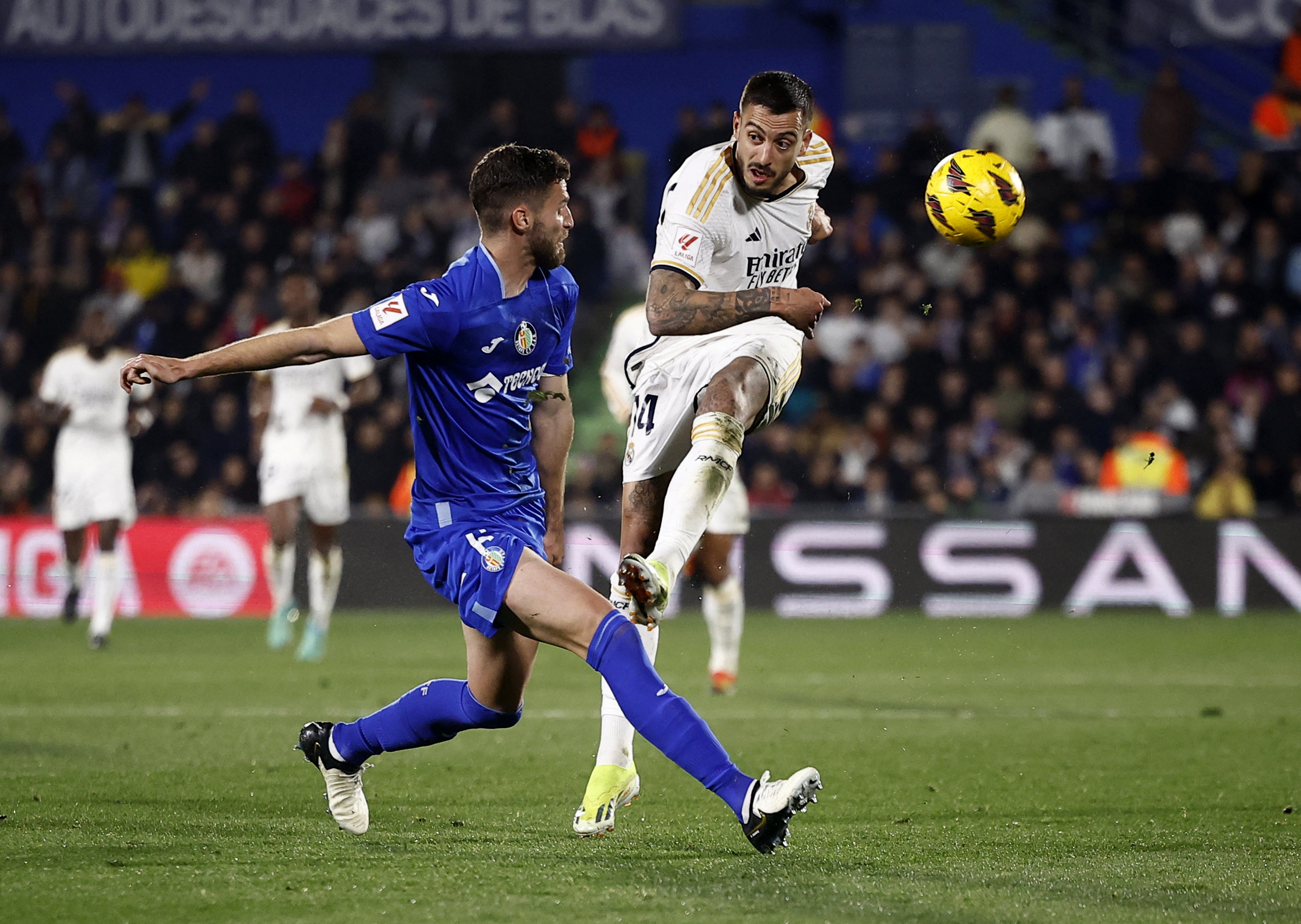 Real Madrid reclaim top spot as Joselu seals win at Getafe | Reuters
