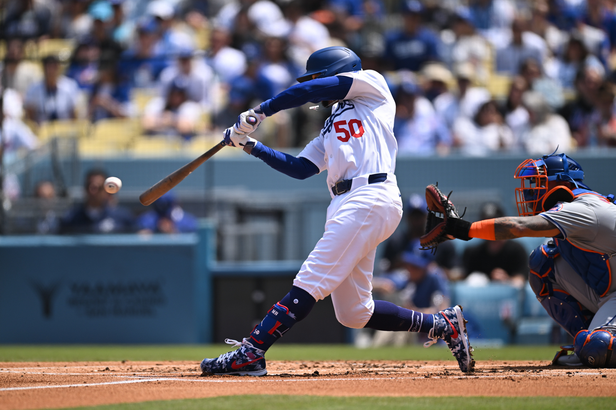 Mets hold on for win over Dodgers to keep hot streak going | Reuters