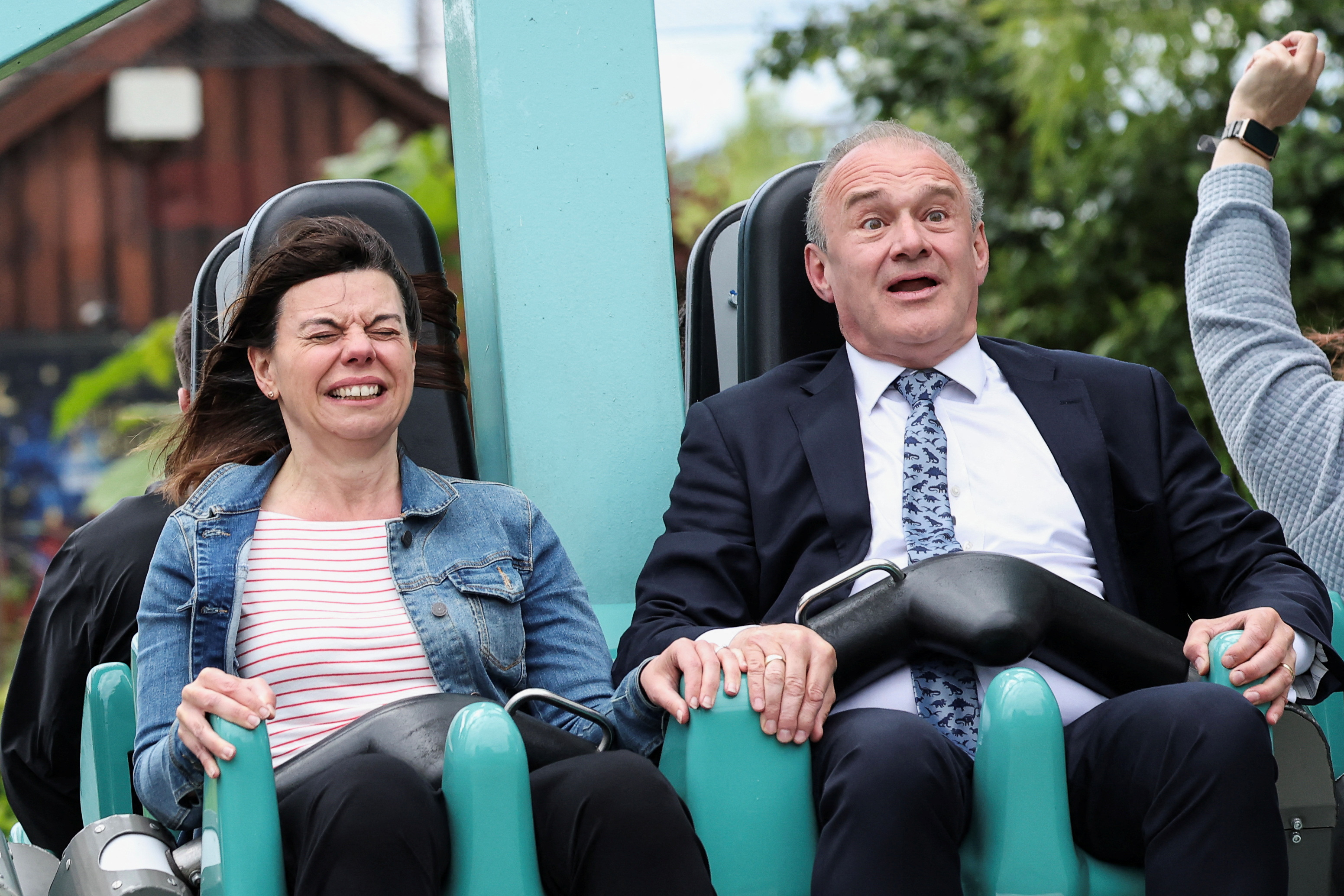 Splashing and sliding Lib Dem leader brings fun to UK election | Reuters