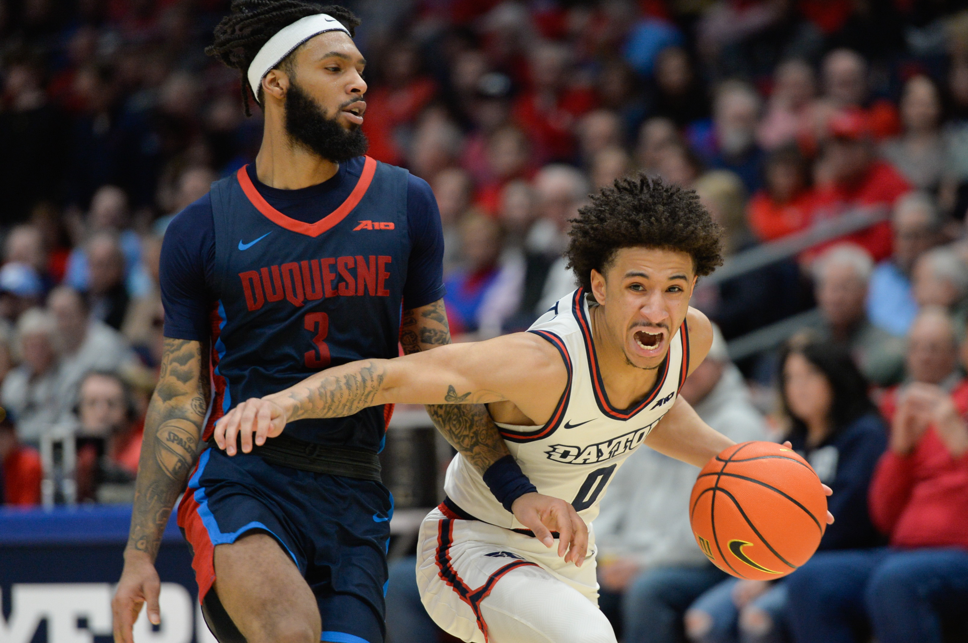DaRon Holmes II powers No. 16 Dayton past Duquesne | Reuters