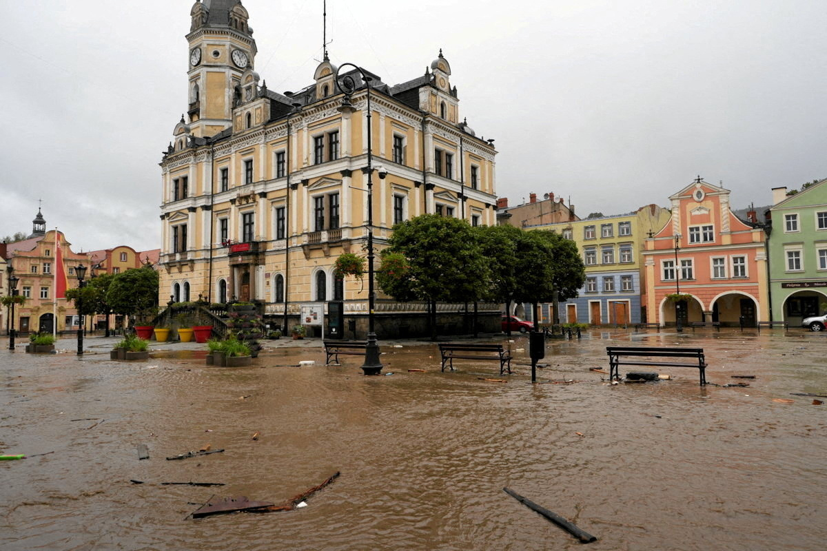 Floods claim more lives as torrential rain pounds central Europe | Reuters