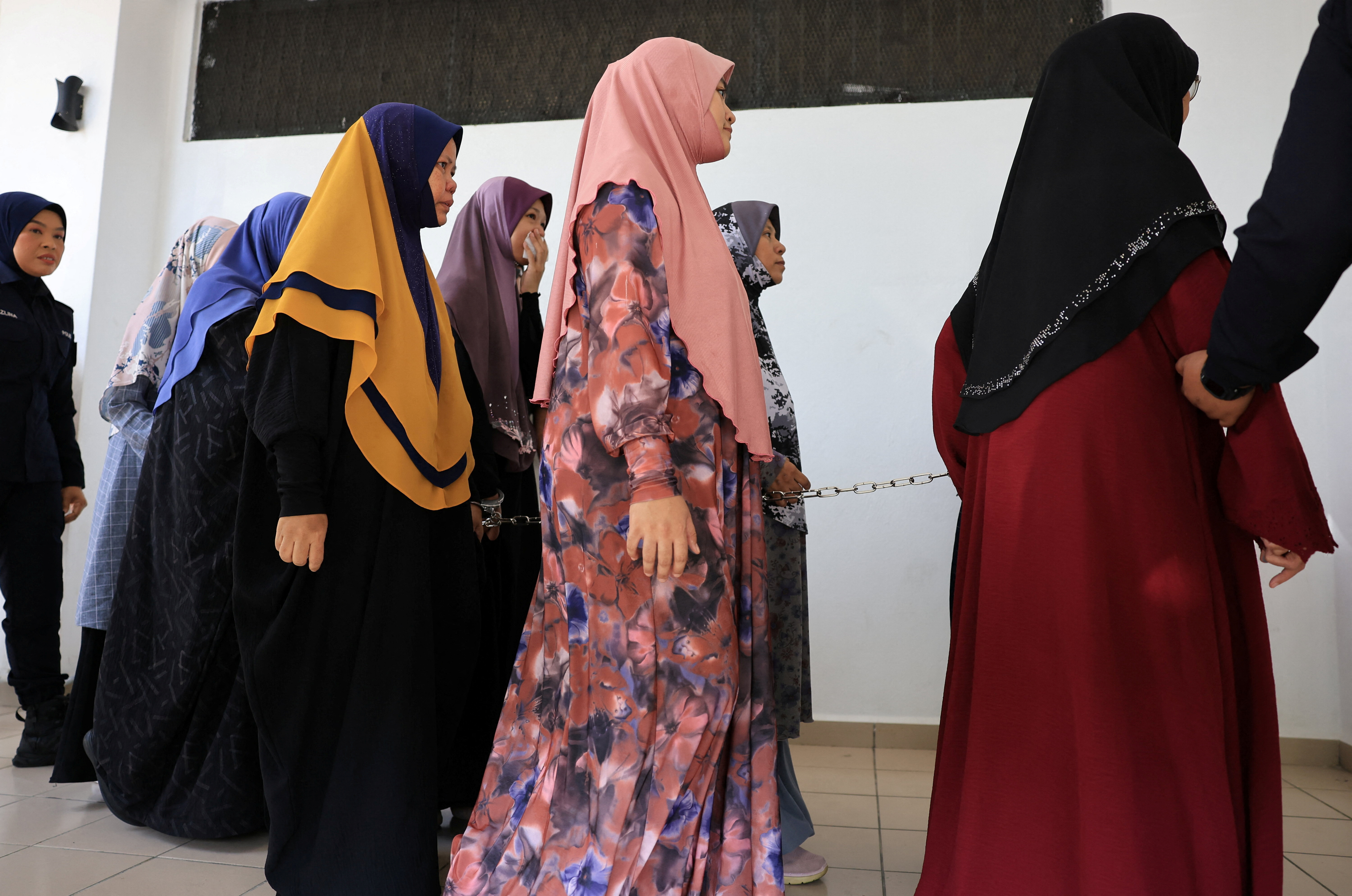 Malaysia charges 22 people linked to Islamic firm GISB with organised crime | Reuters