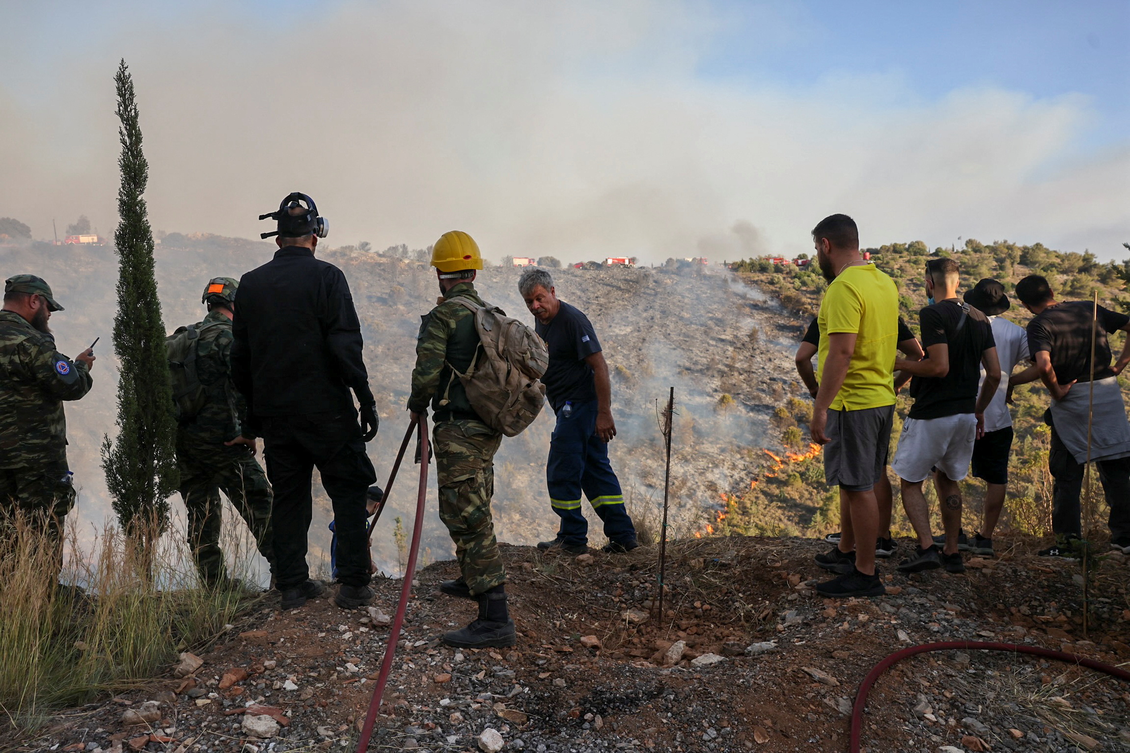 Wildfire rages near Athens, damaging homes | Reuters