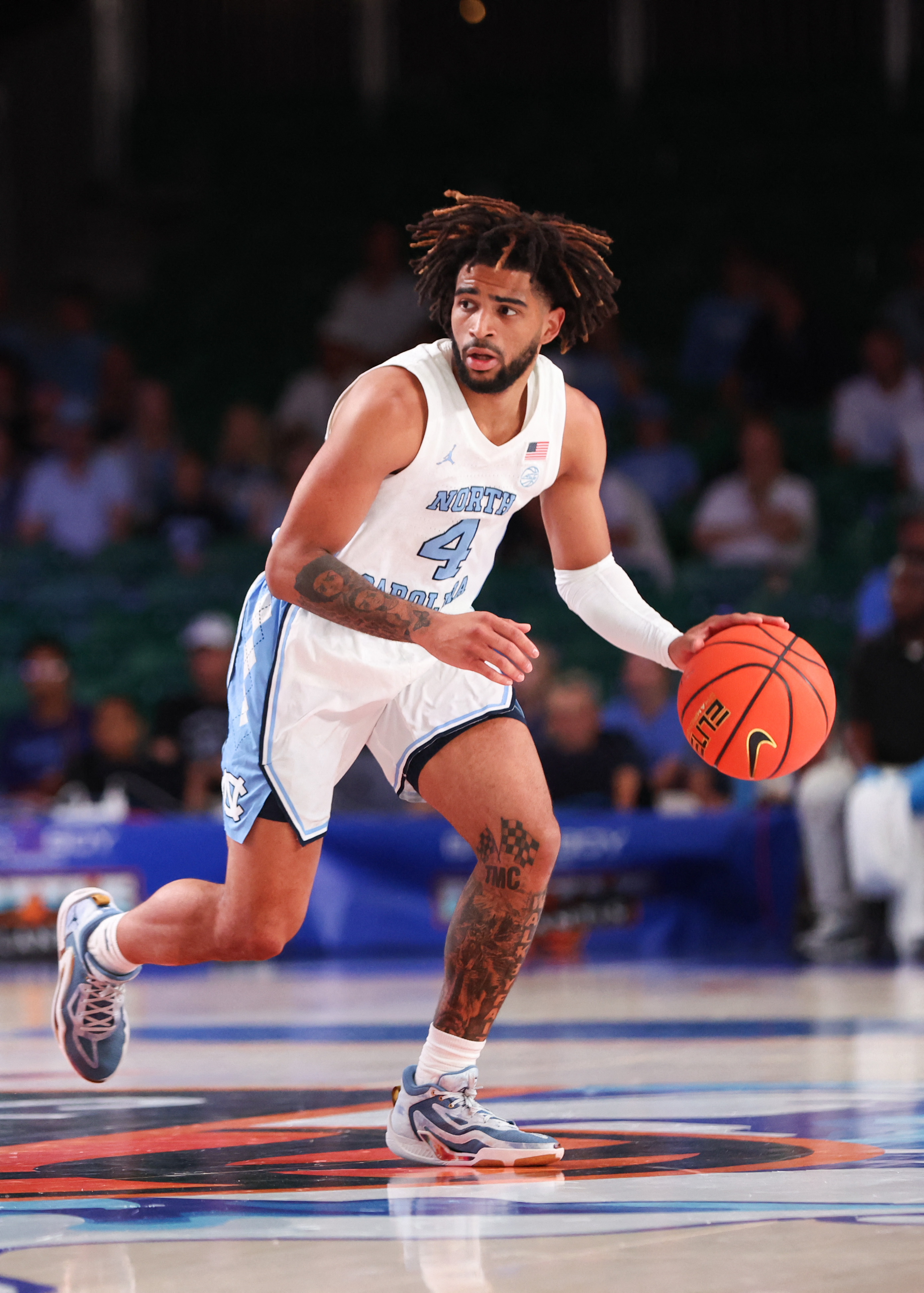 RJ Davis paces No. 14 North Carolina past No. 20 Arkansas | Reuters