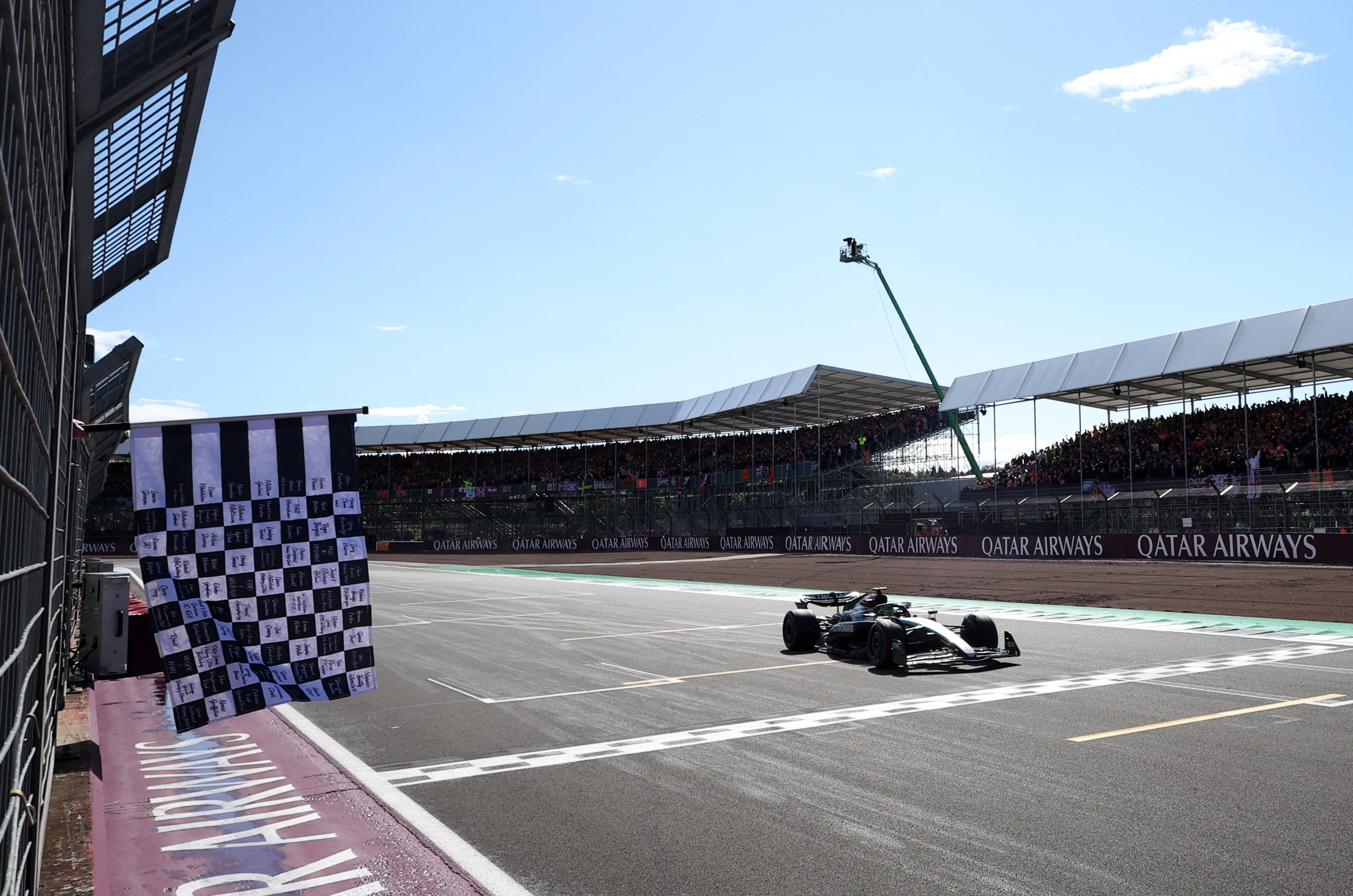 Tearful Hamilton ends long wait with record British win | Reuters