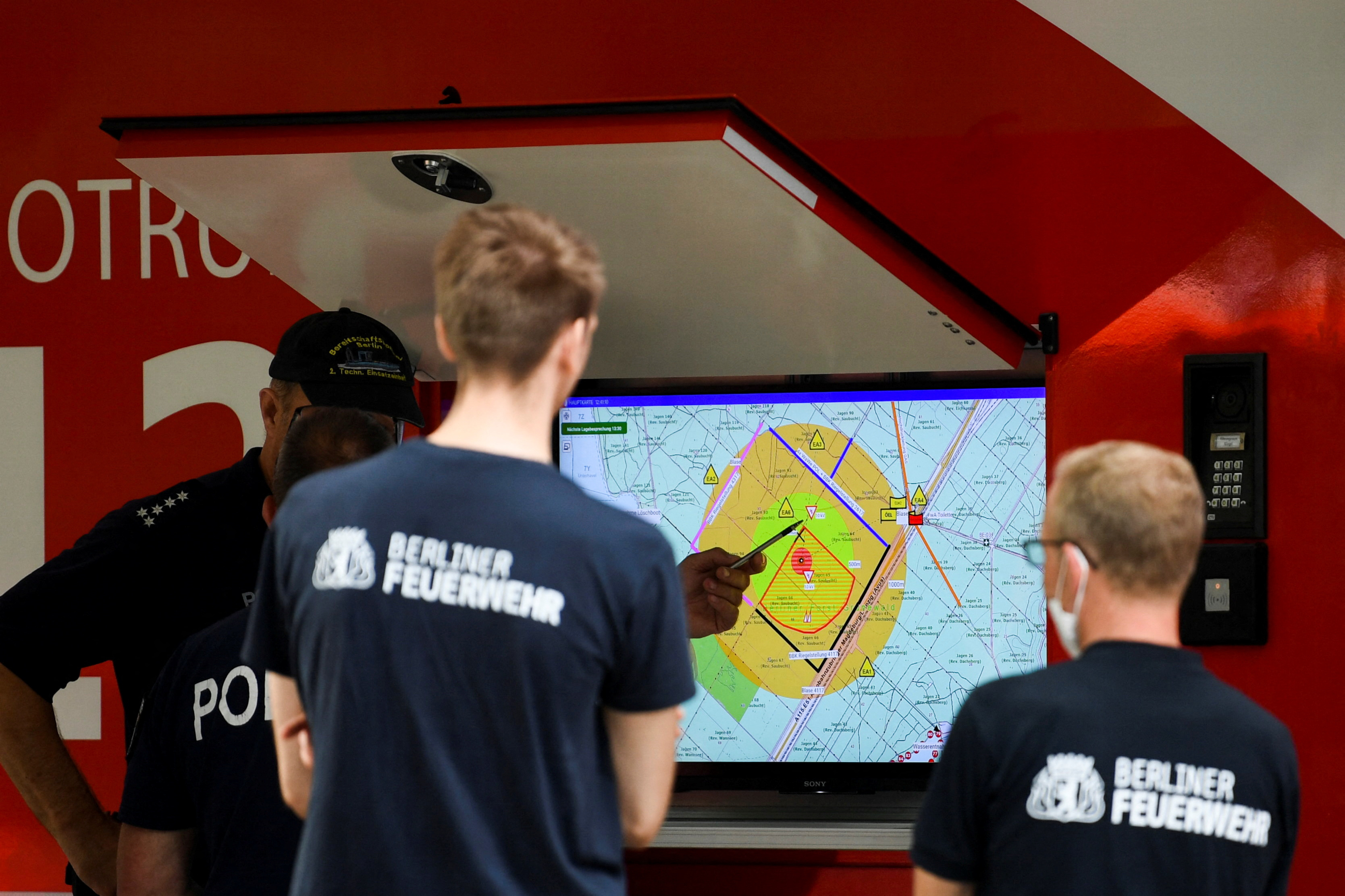 Berlin munitions dump blaze still active as explosion risk impedes fire ...