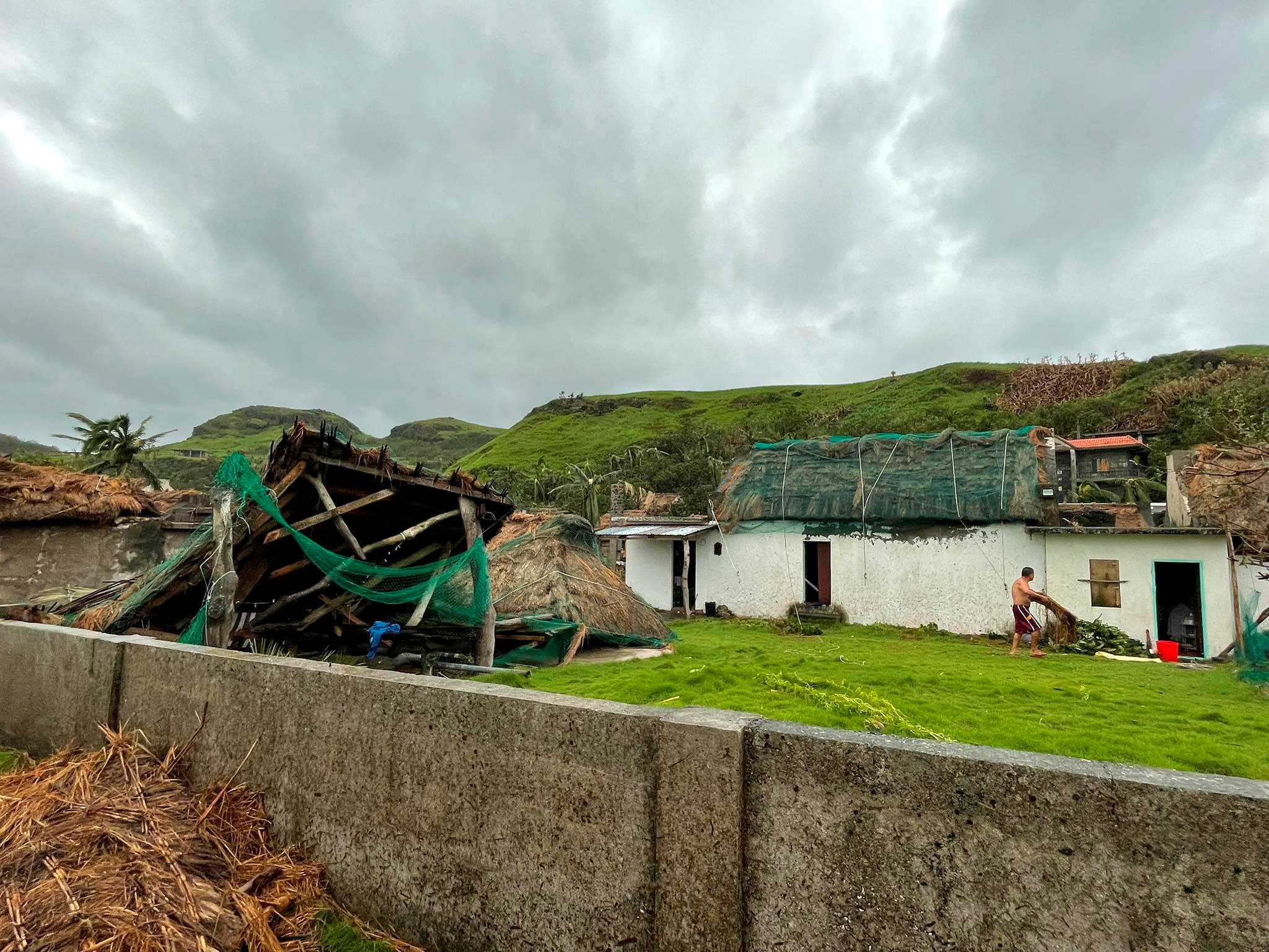 Strong typhoon cuts power, causes flooding in northern Philippines ...