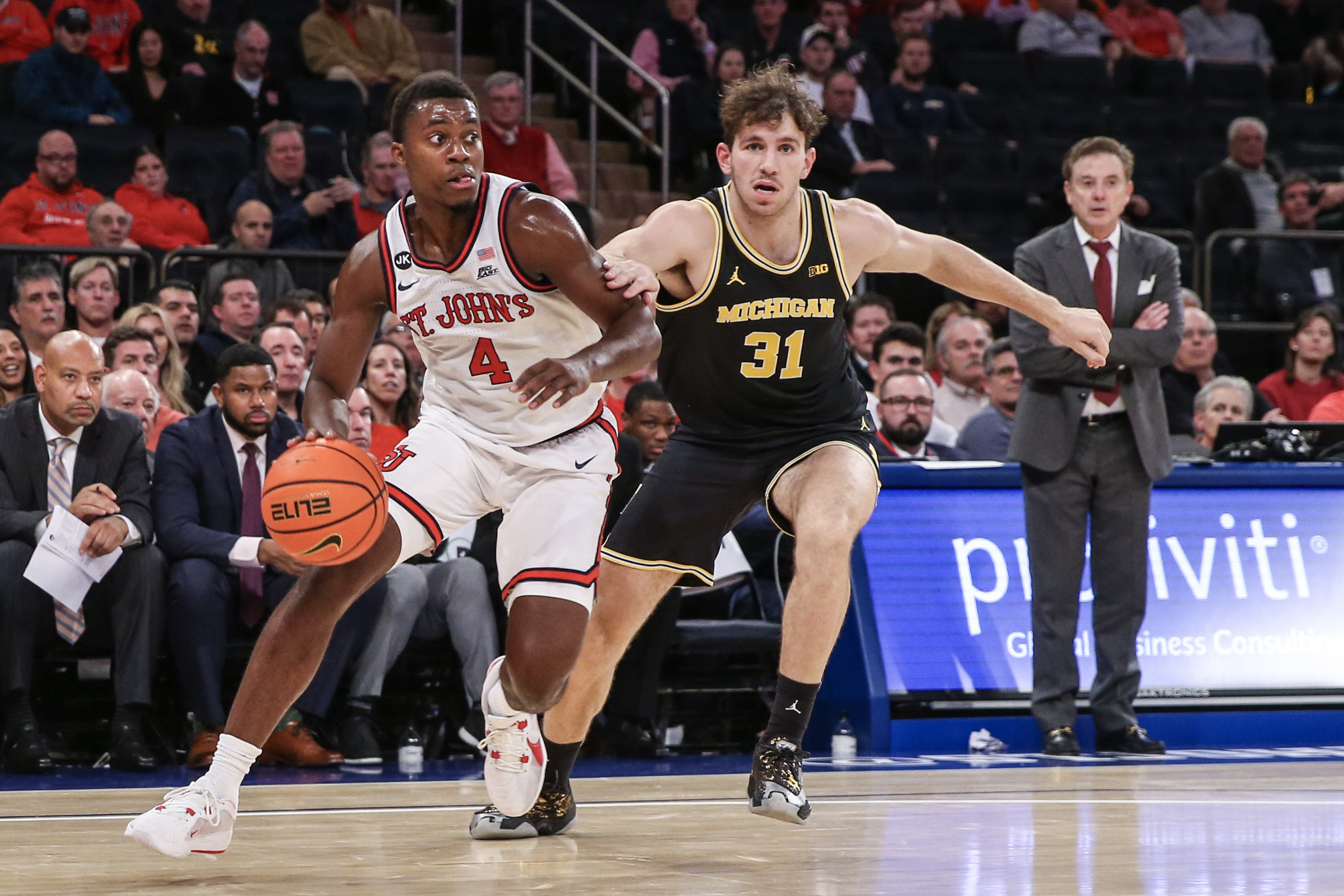 Dug McDaniel, Nimari Burnett power Michigan past St. John's | Reuters