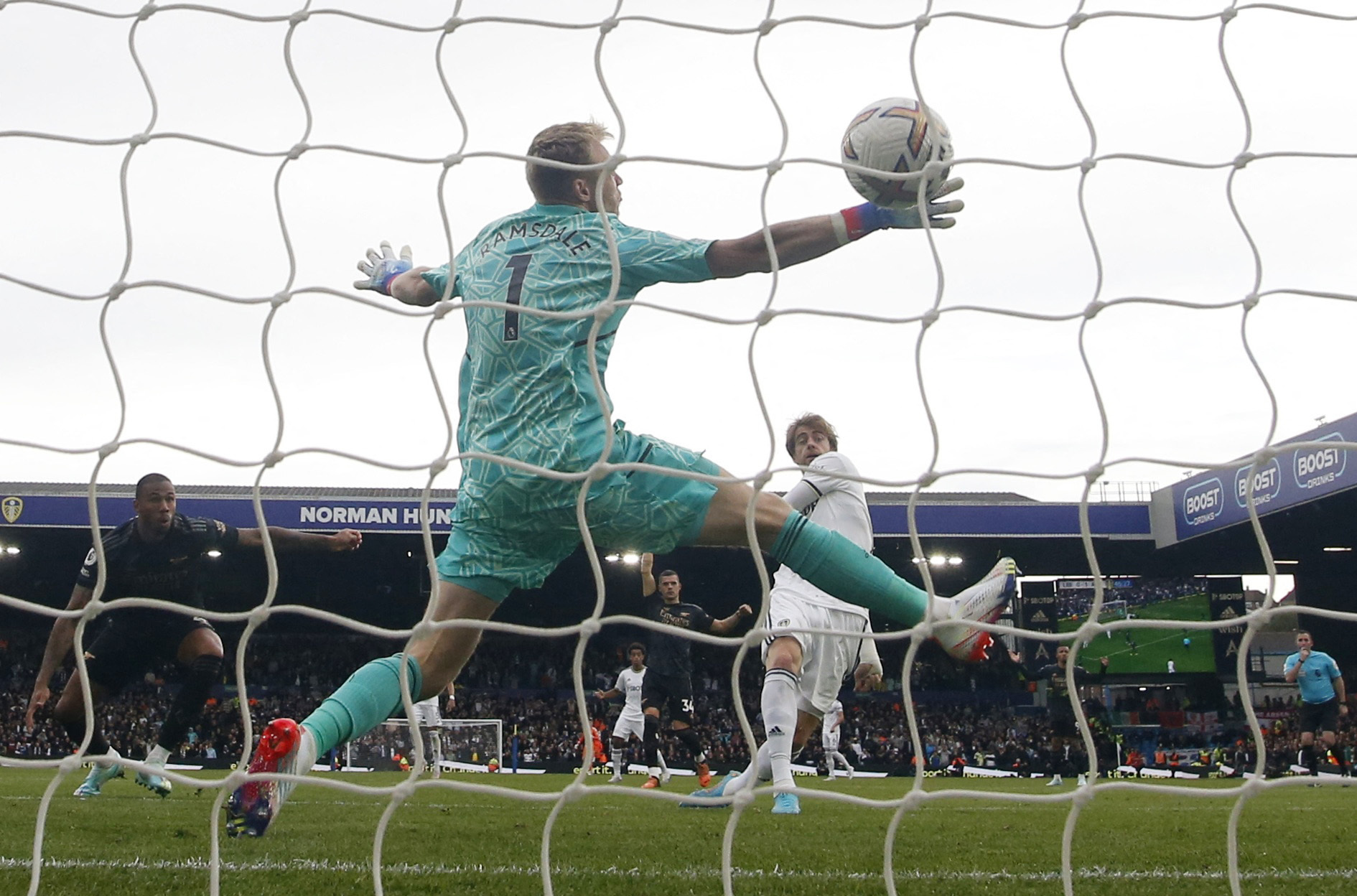 Arsenal hold off hungry Leeds to stay top of Premier League | Reuters