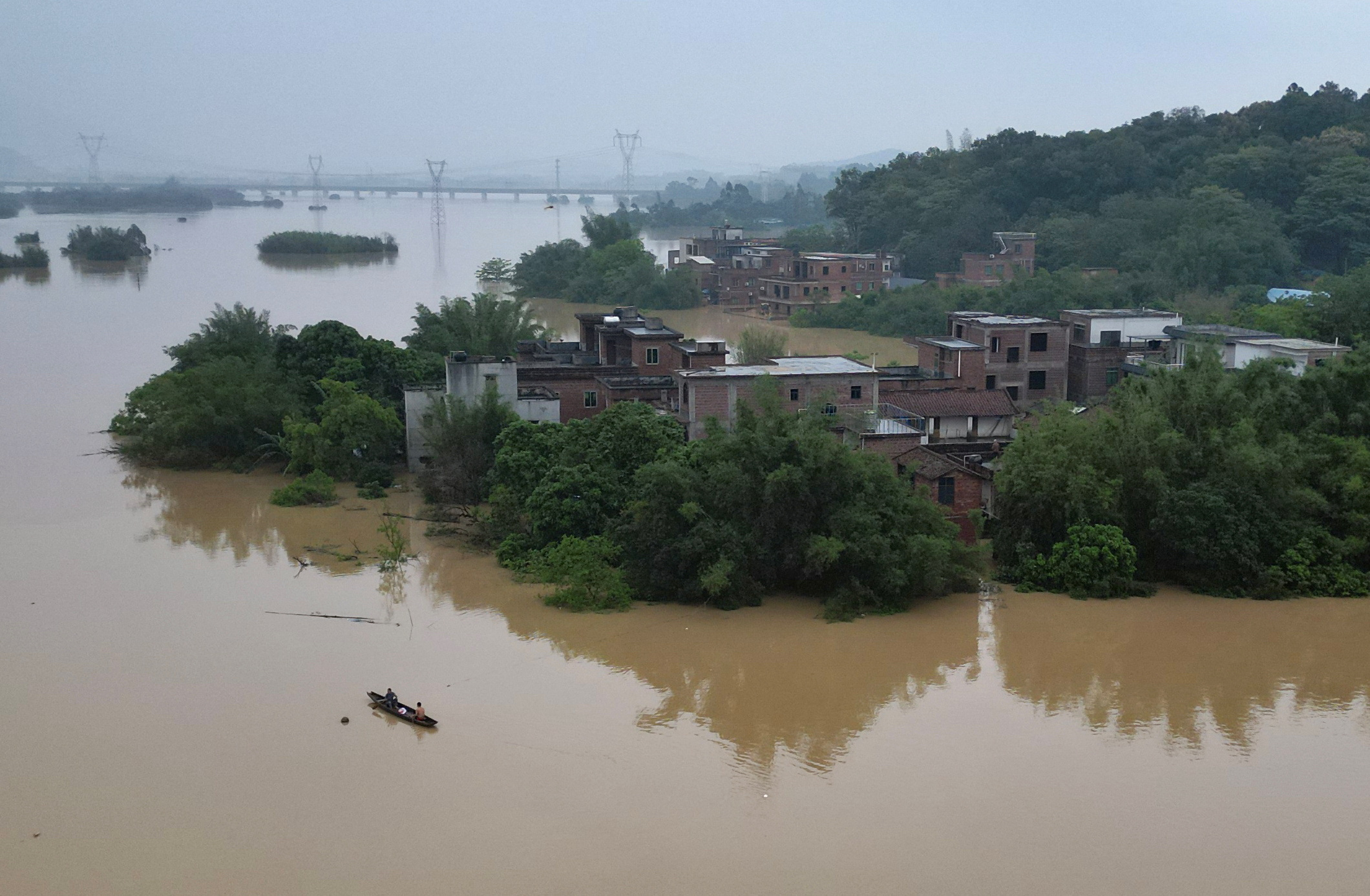Floods swamp southern China, spark extreme weather fears | Reuters