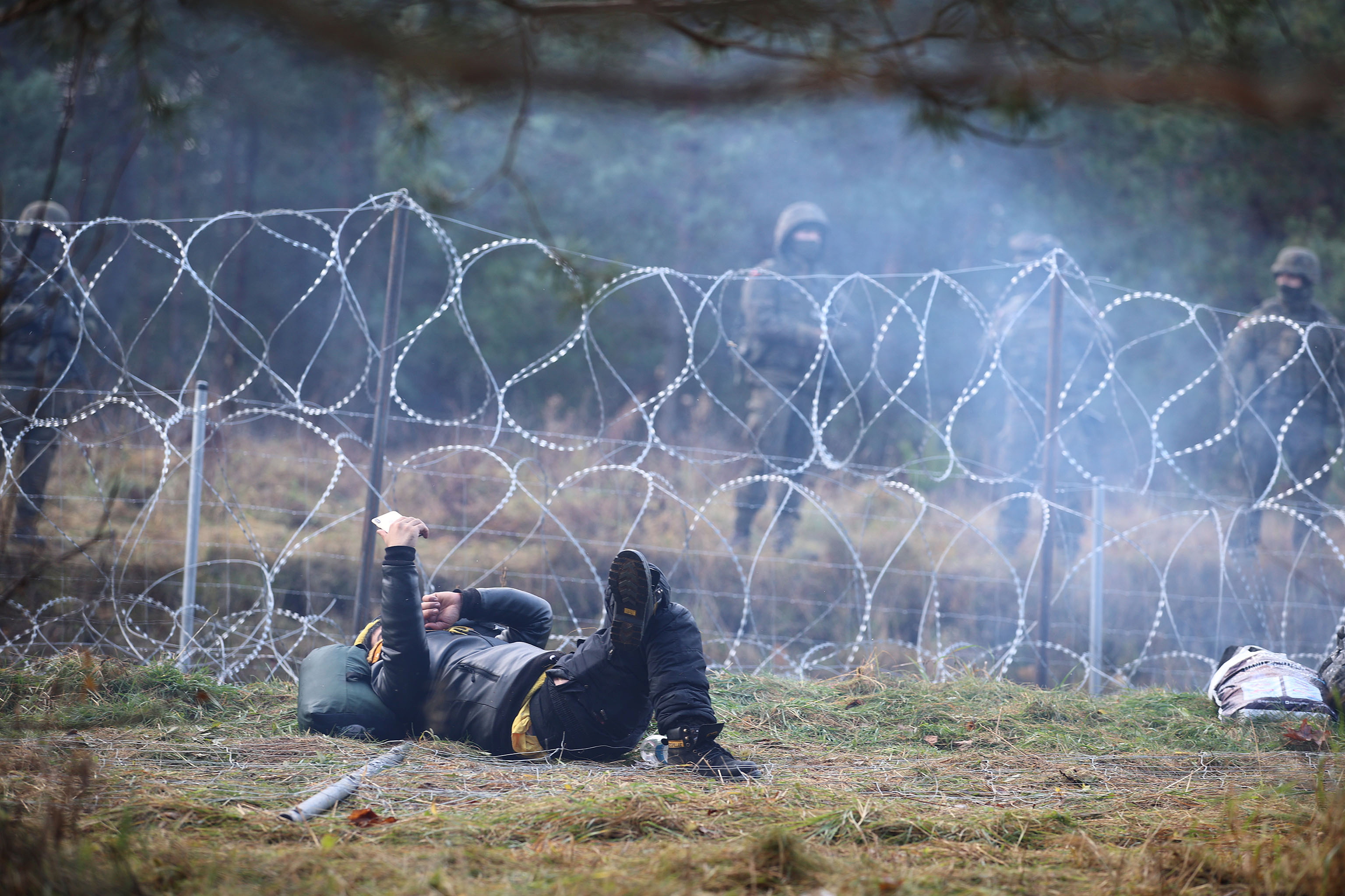 EU accuses Belarus of 'gangster' methods as migrants shiver at Polish ...