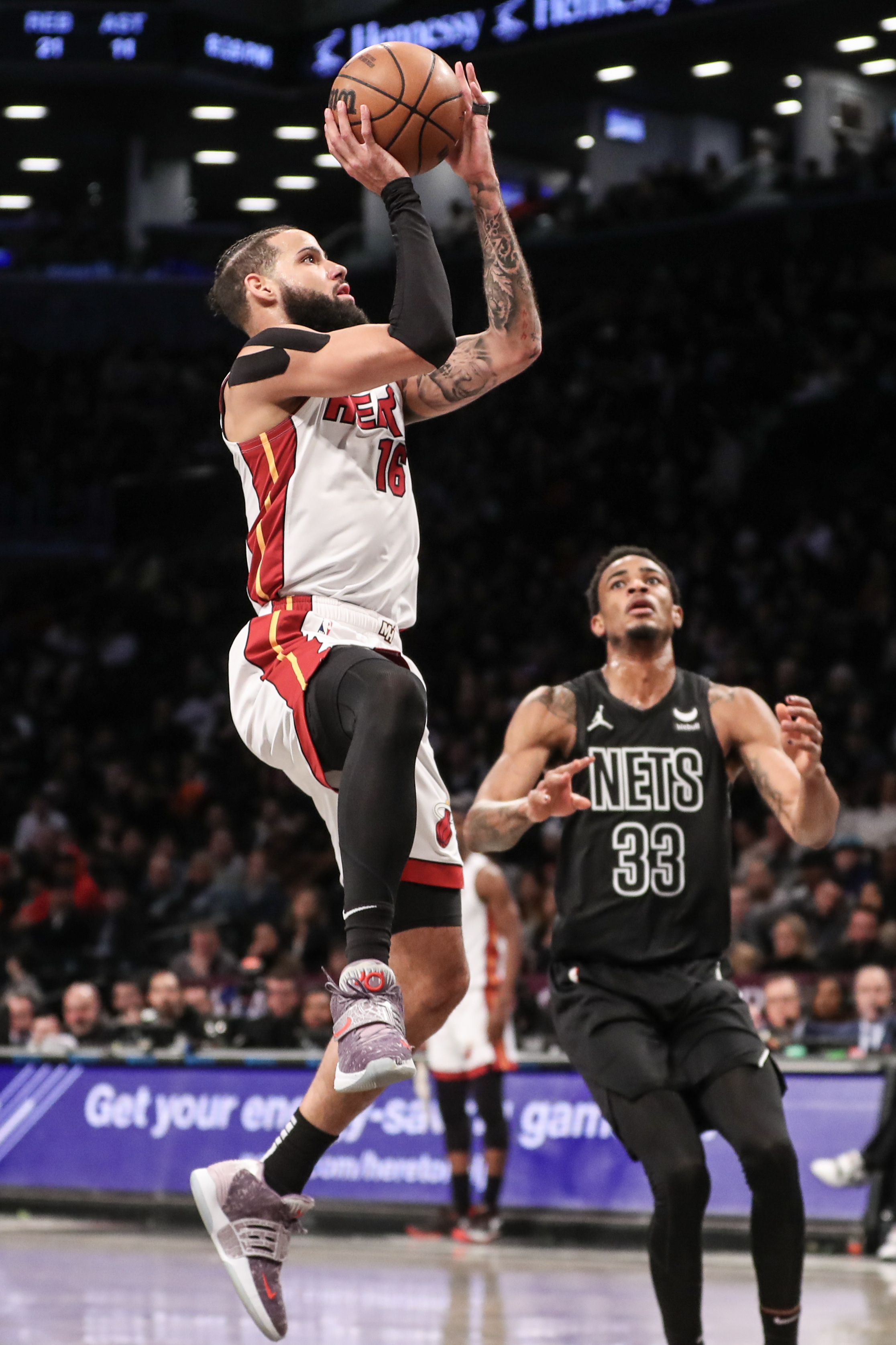 Jimmy Butler returns to guide Heat past Nets in OT | Reuters