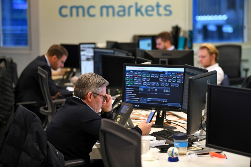 UK's CMC Markets to cut 17% of global staff | Reuters