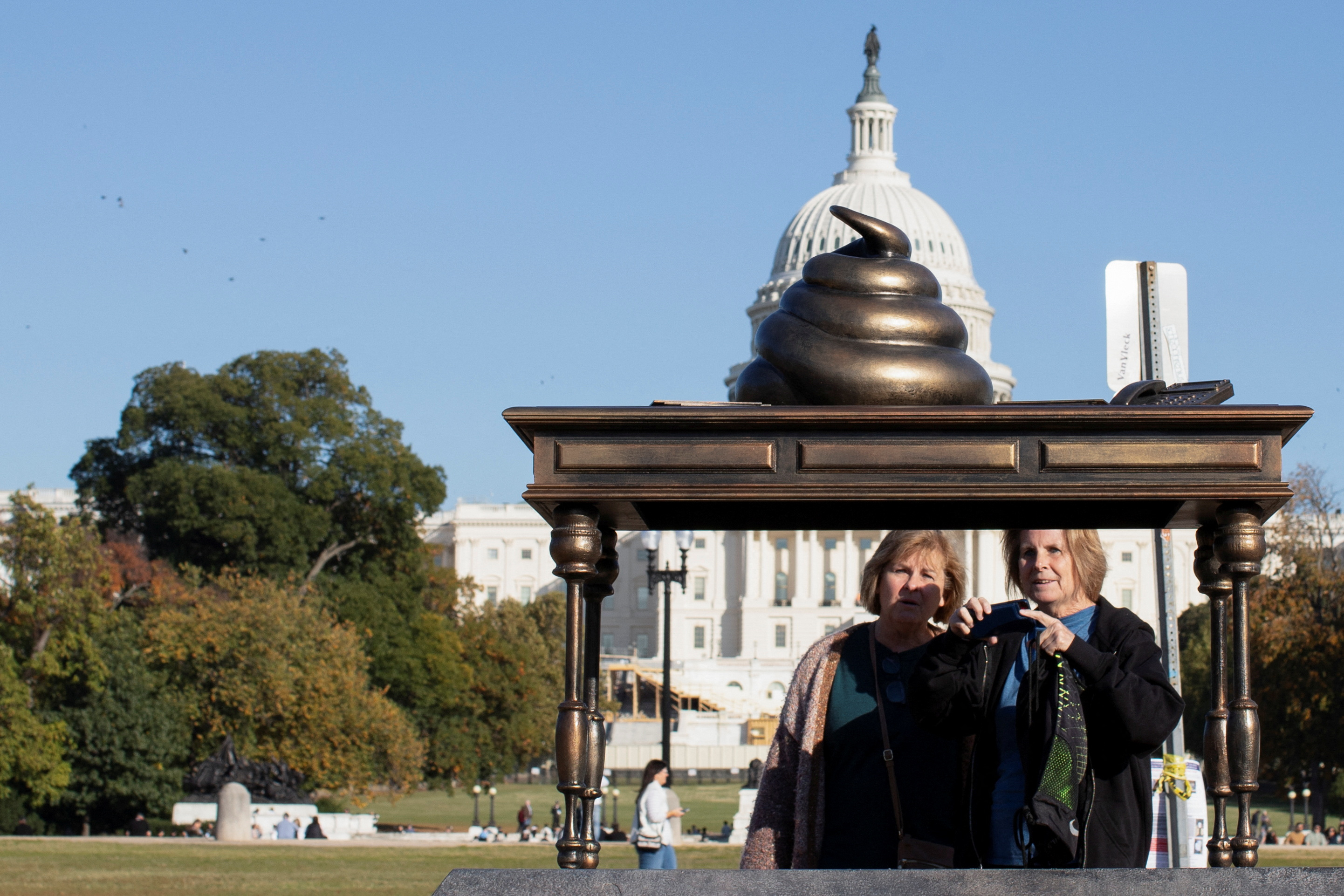 Poop-emoji statue near US Capitol evokes stain of Jan. 6 riot | Reuters