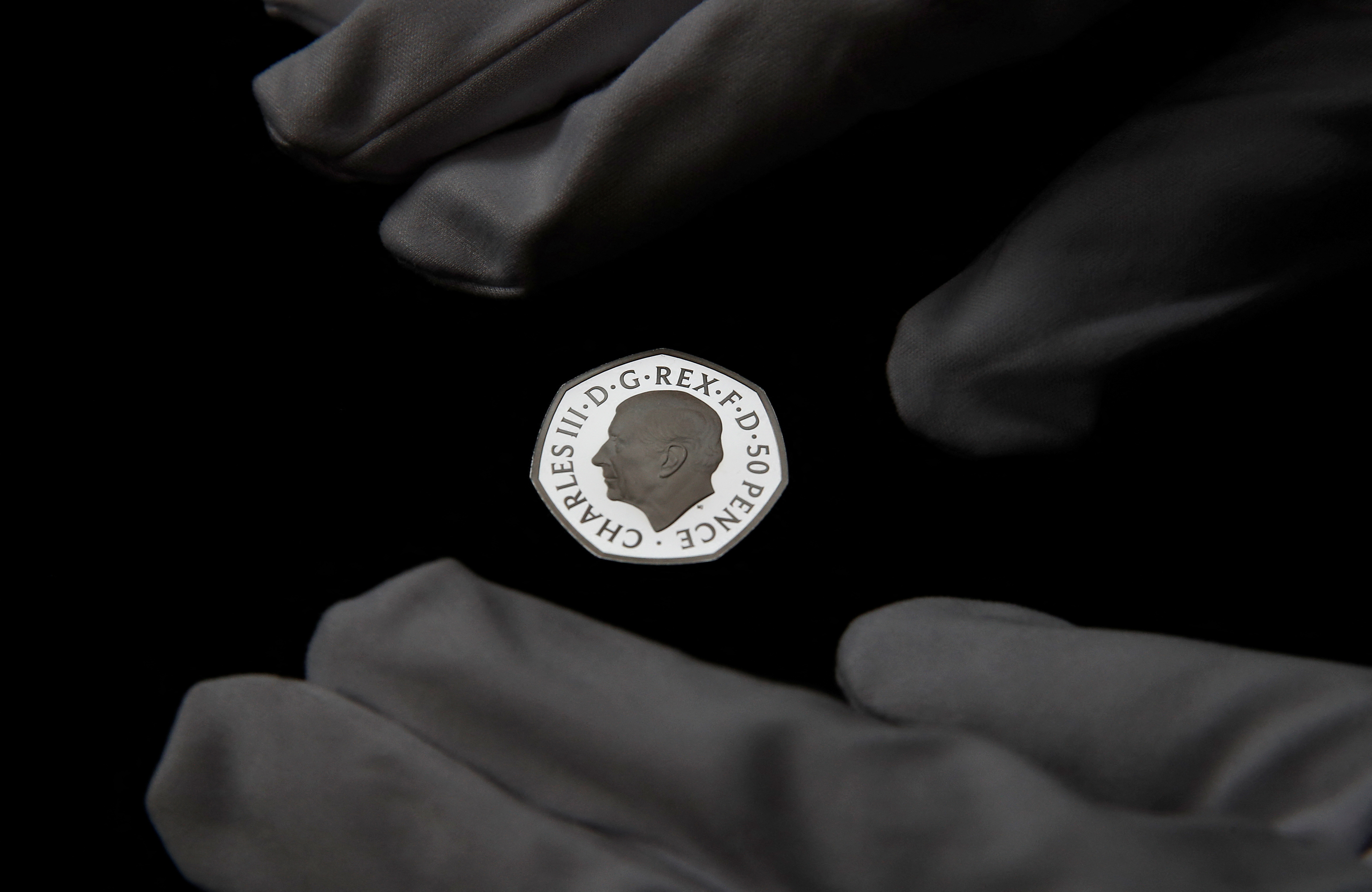 New UK coins featuring image of King Charles revealed | Reuters