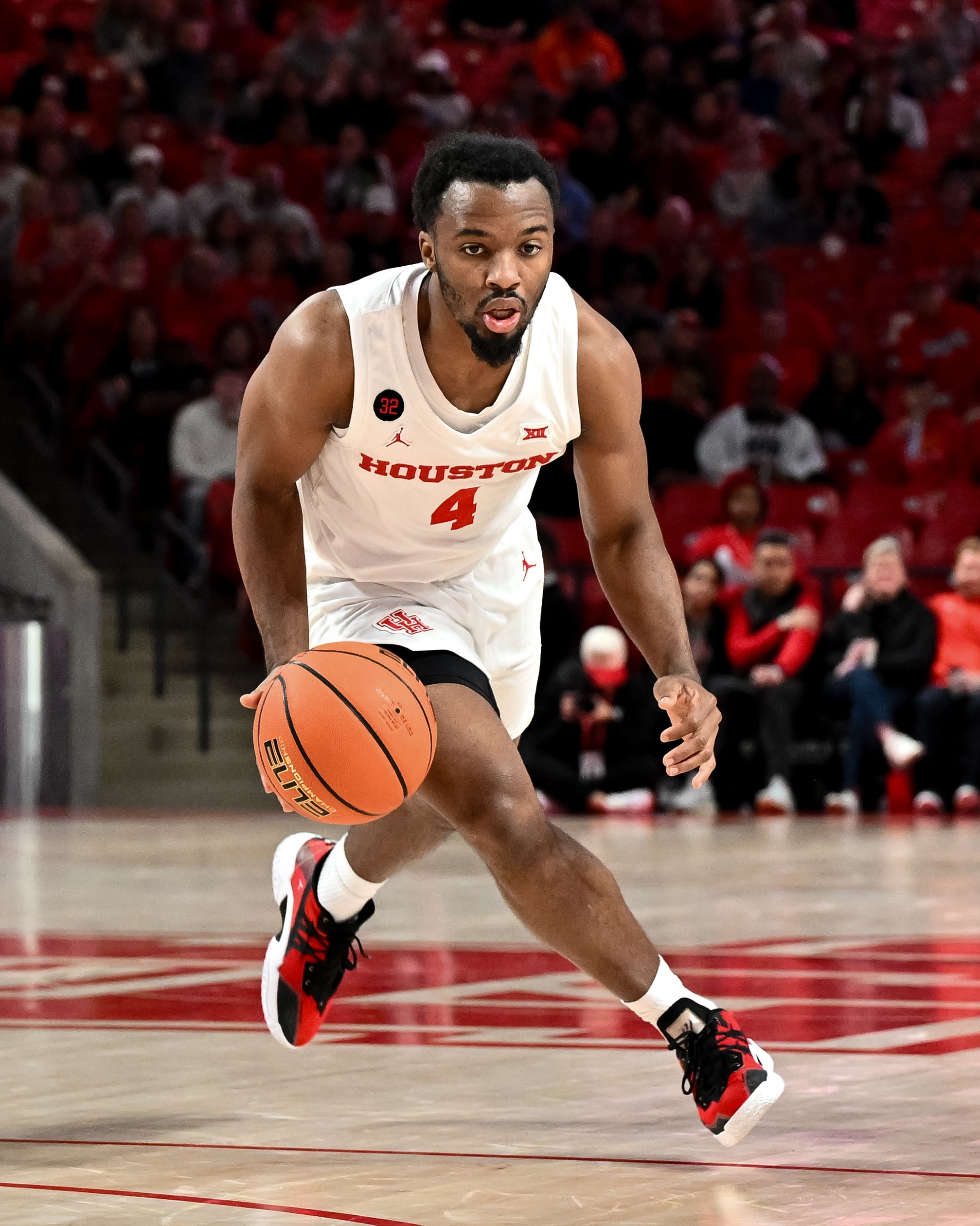 L.J. Cryer hits milestone as No. 3 Houston blitzes Penn | Reuters