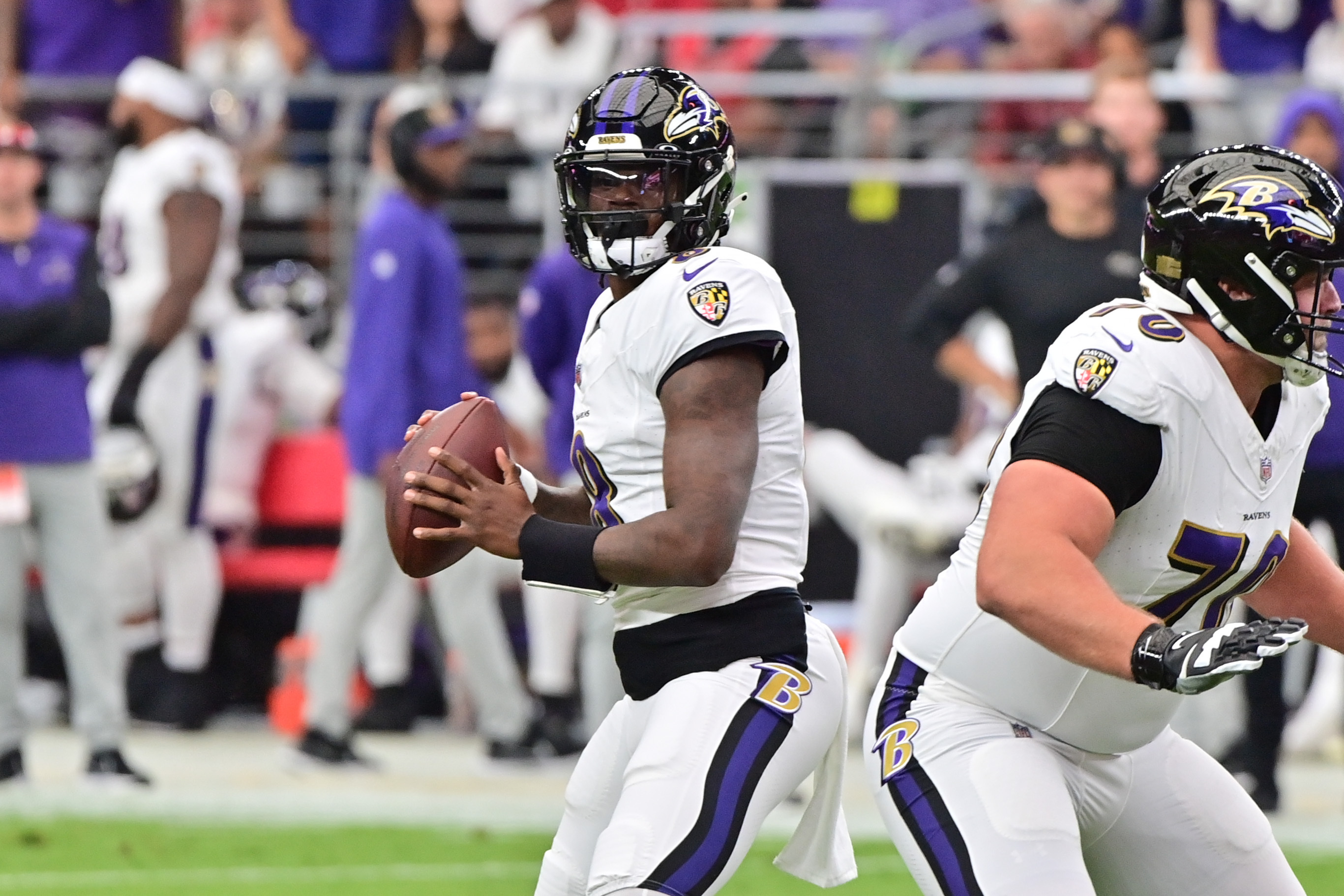 Gus Edwards racks up 3 TDs as Ravens fend off Cardinals | Reuters