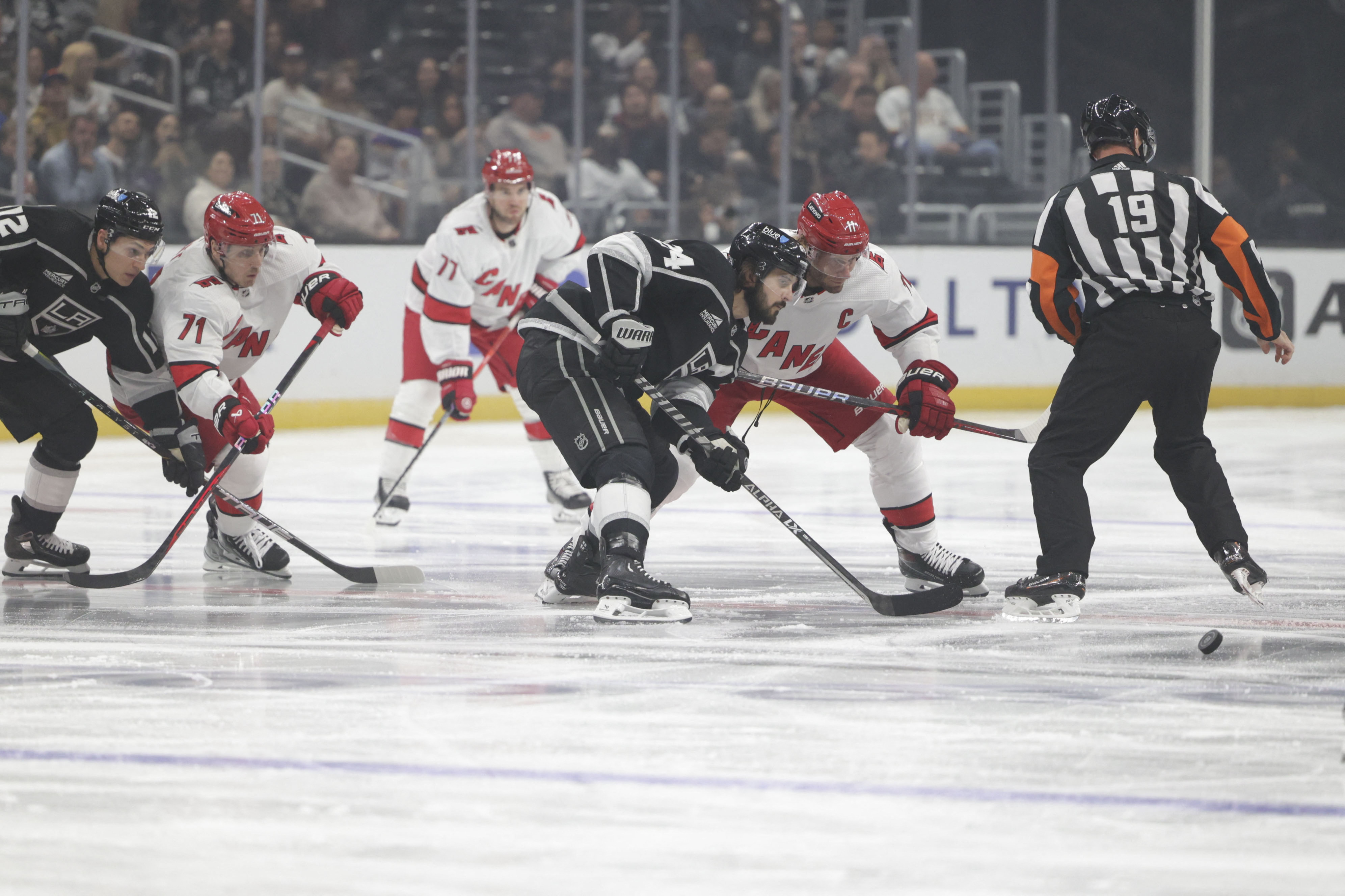 Hurricanes blow early lead, beat Kings in 9-round shootout | Reuters