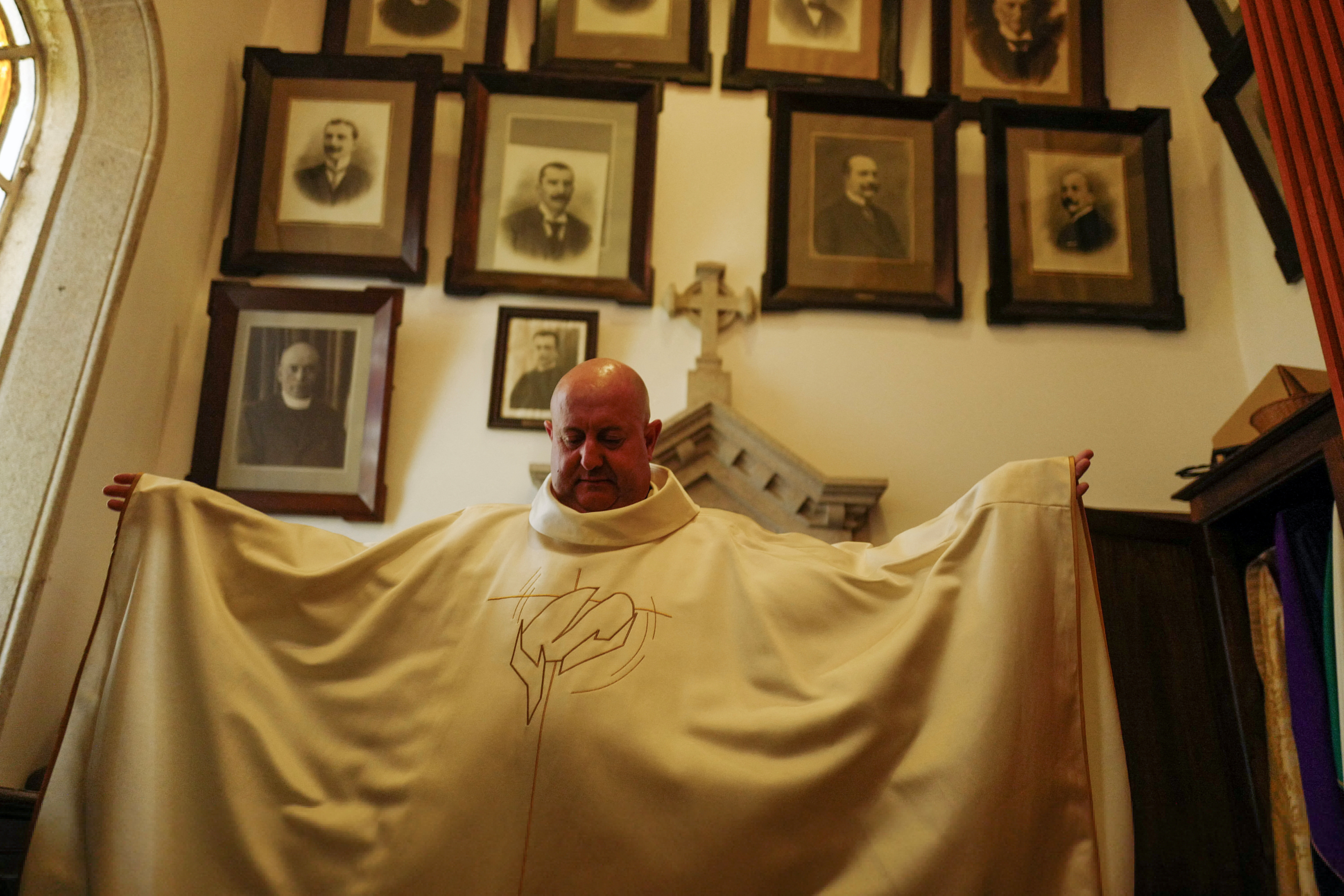 Portuguese 'DJ priest' plays upbeat tunes to spread hope | Reuters