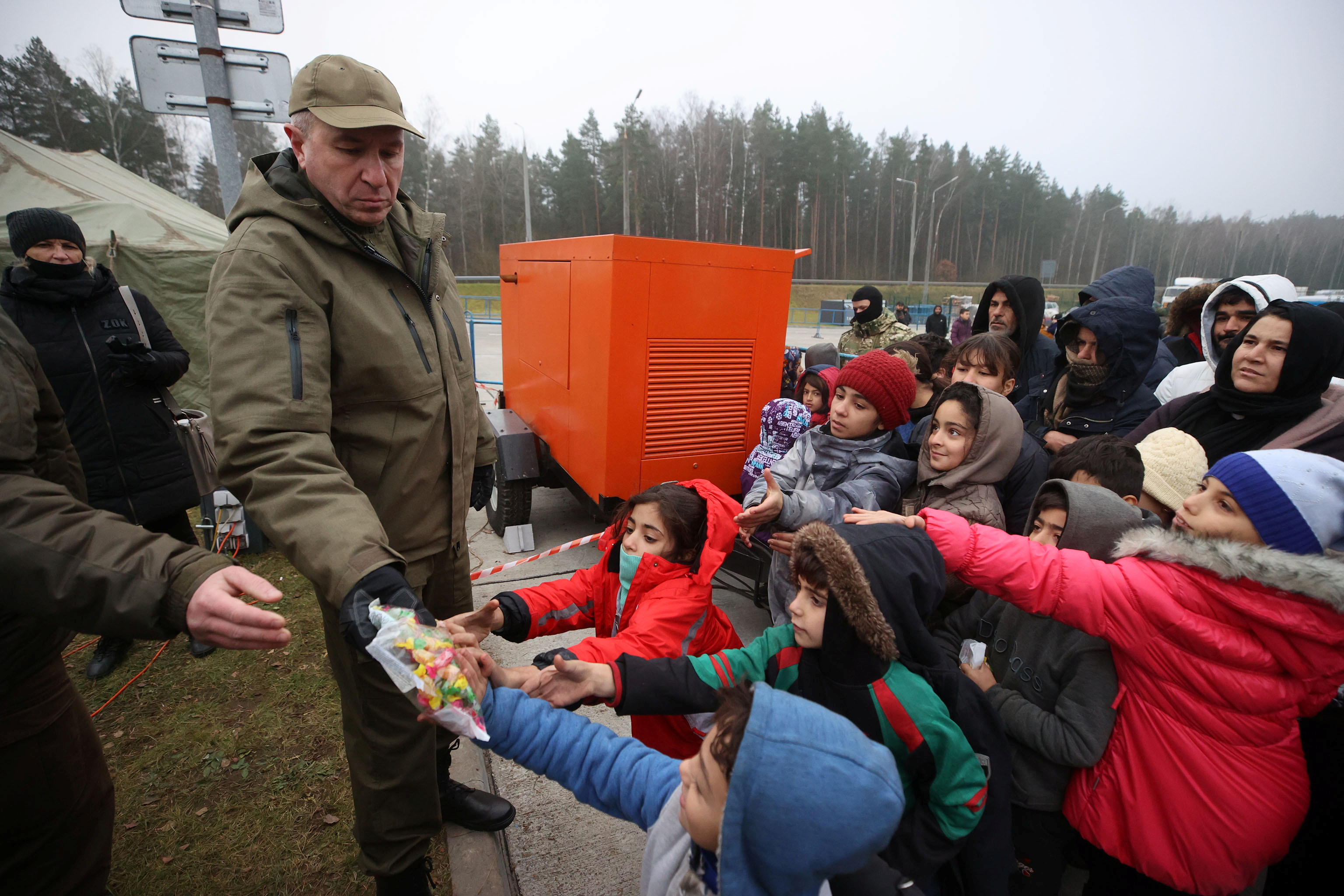 EU to send aid to migrants at Belarus border | Reuters