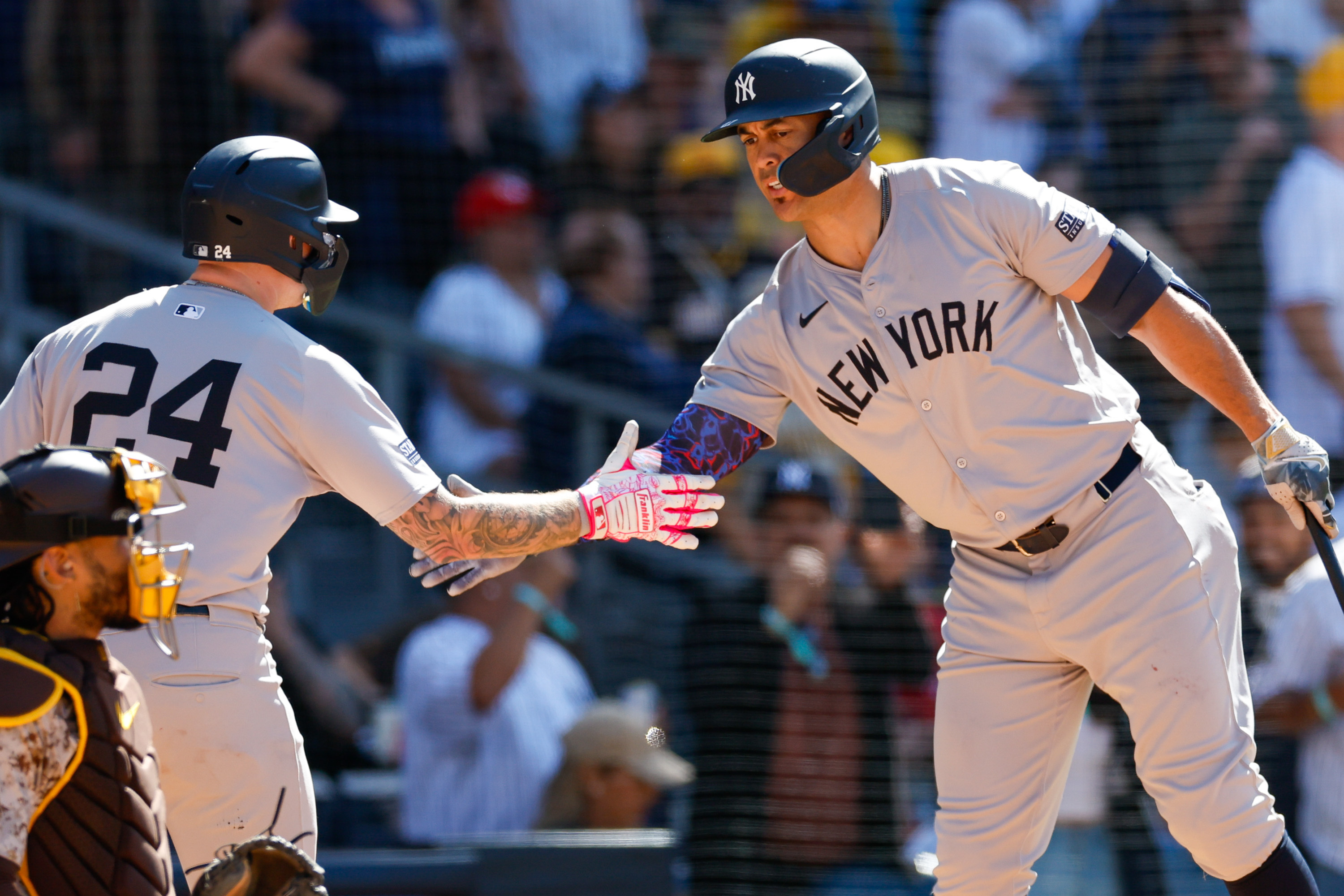 Padres post 4-run sixth, cool off Yanks to avoid sweep | Reuters