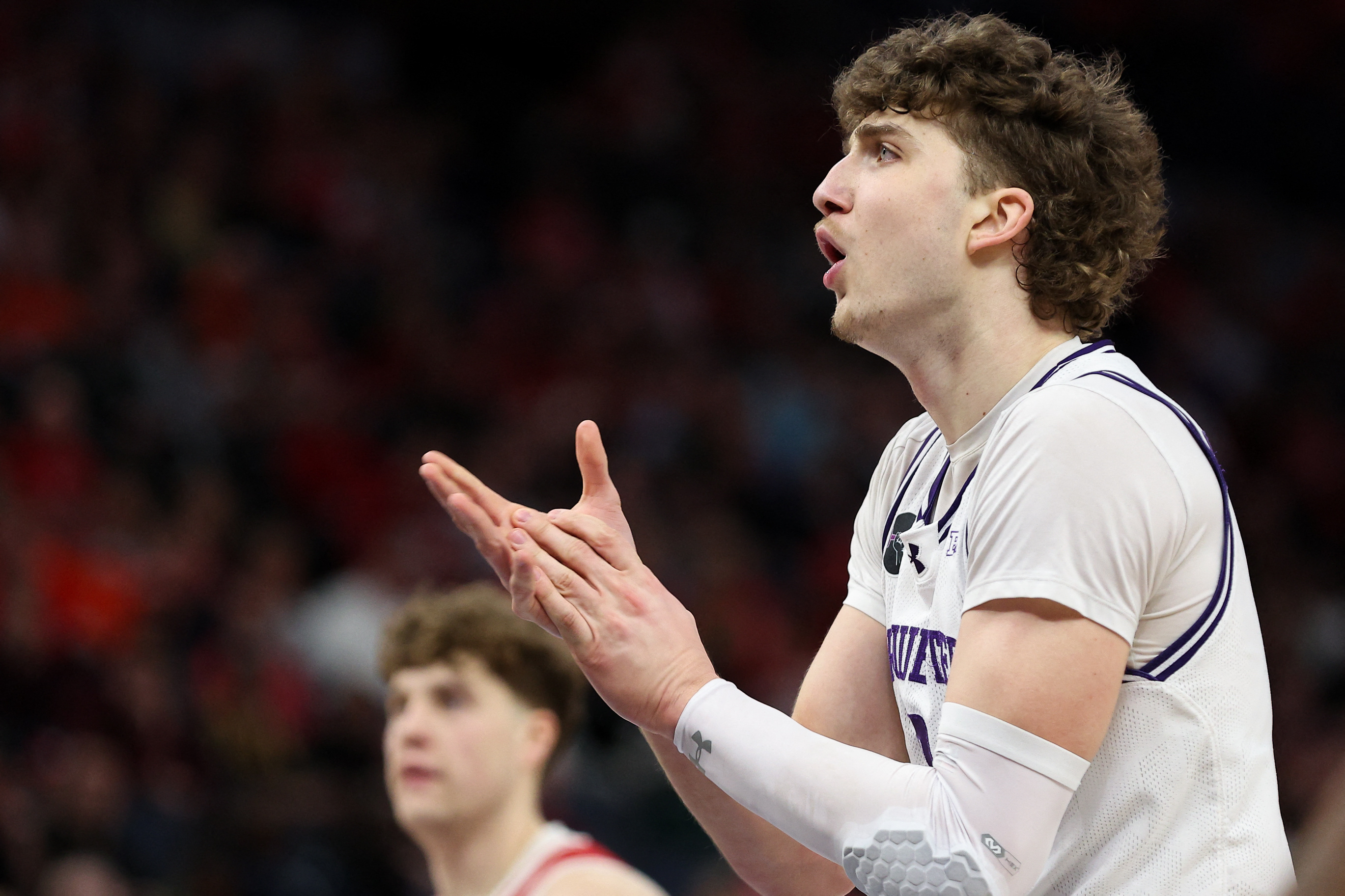 AJ Storr paces Wisconsin past Northwestern and into Big Ten semis | Reuters