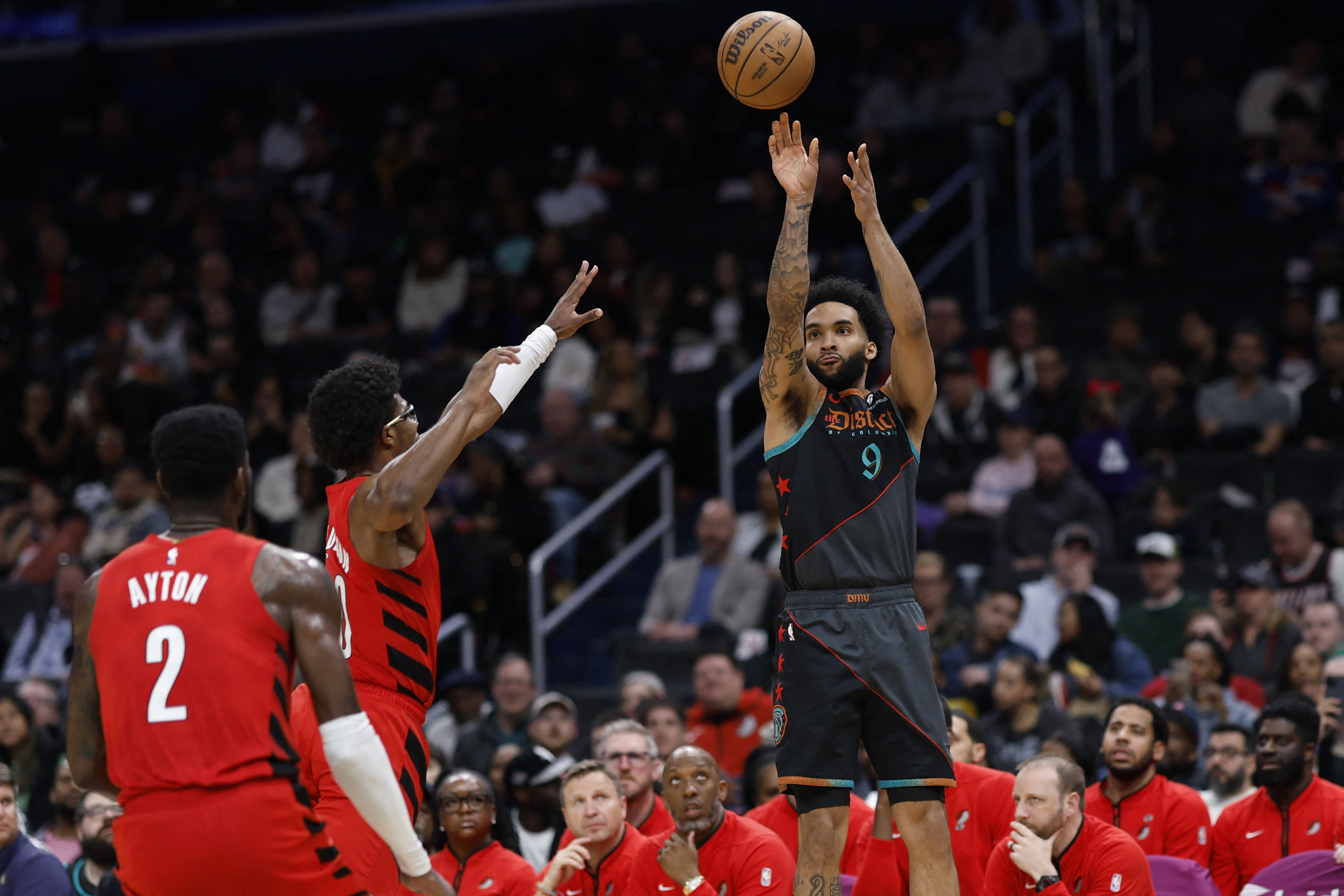 Deandre Ayton, Blazers hand Wizards another loss | Reuters