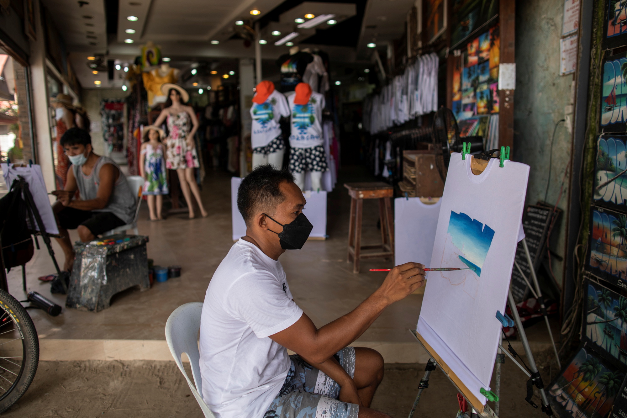 Filipino artist fears longer struggle as COVID variant stalls tourism ...