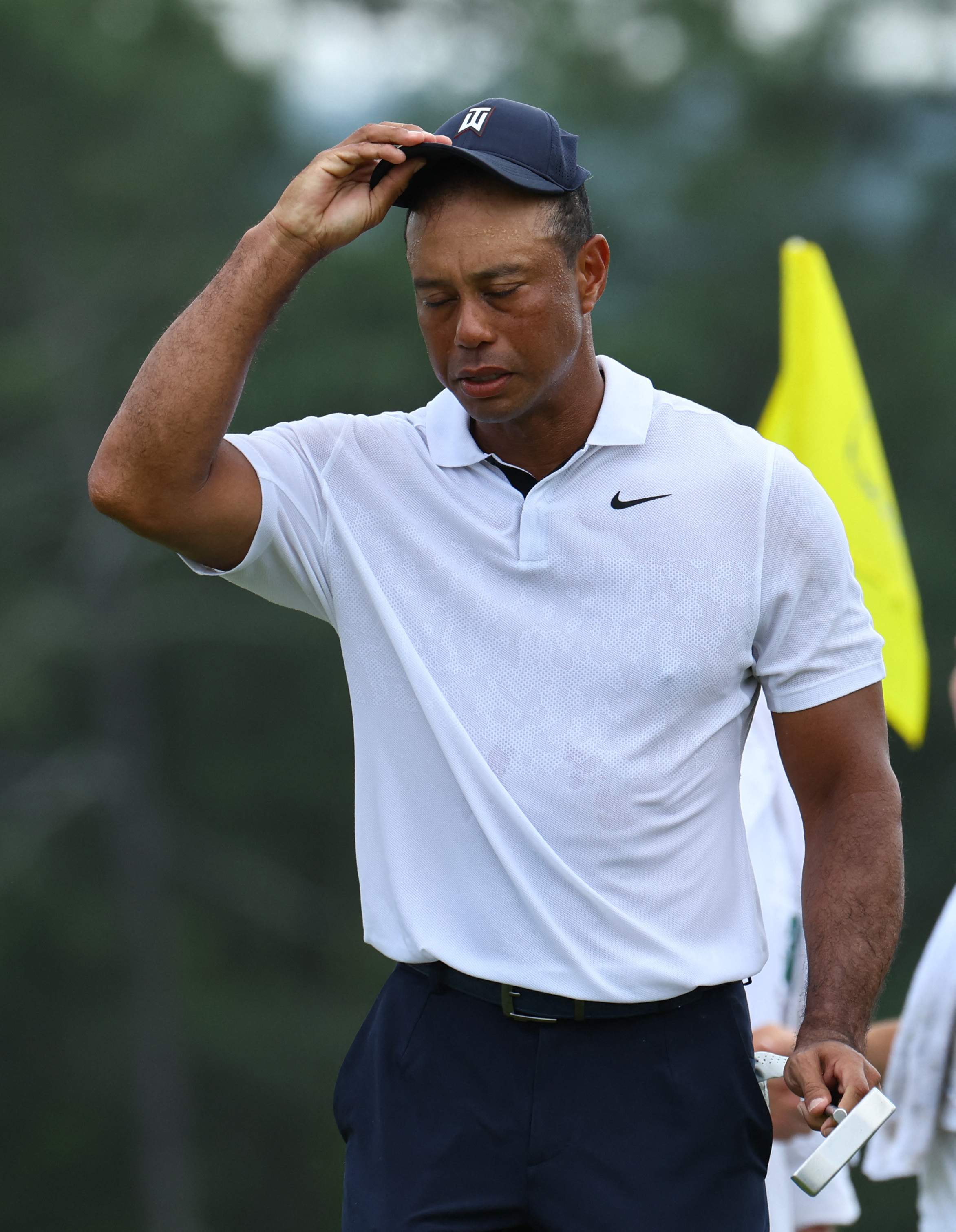 Rusty Woods fights to keep alive Masters cut streak | Reuters