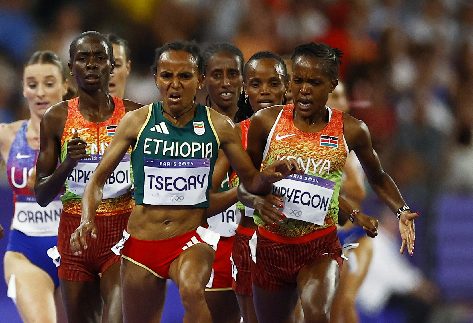 Athletics-Kenya's Chebet charges to 5,000m gold, Kipyegon's silver ...