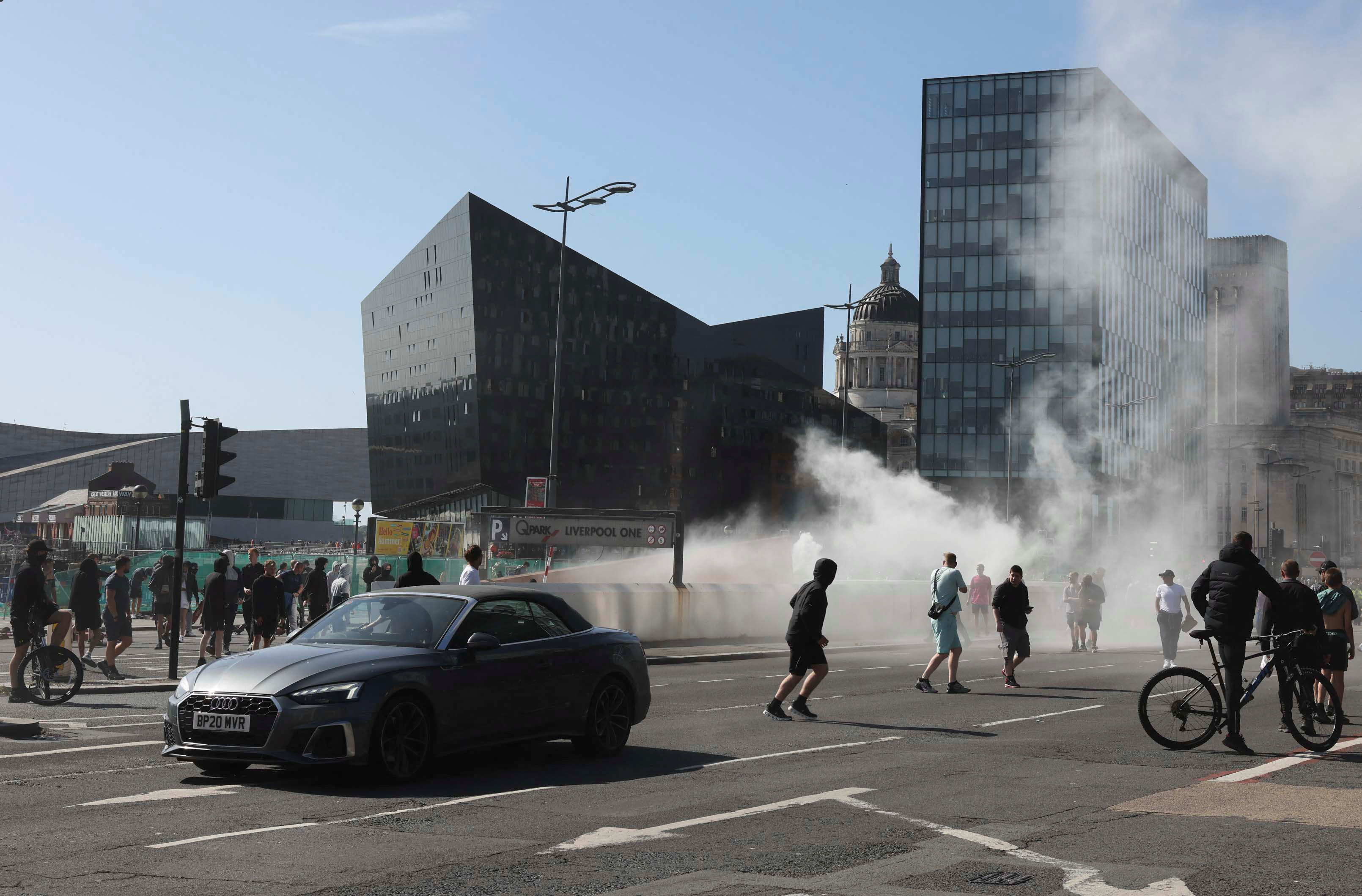 Renewed rioting sweeps British cities in wake of child murders | Reuters