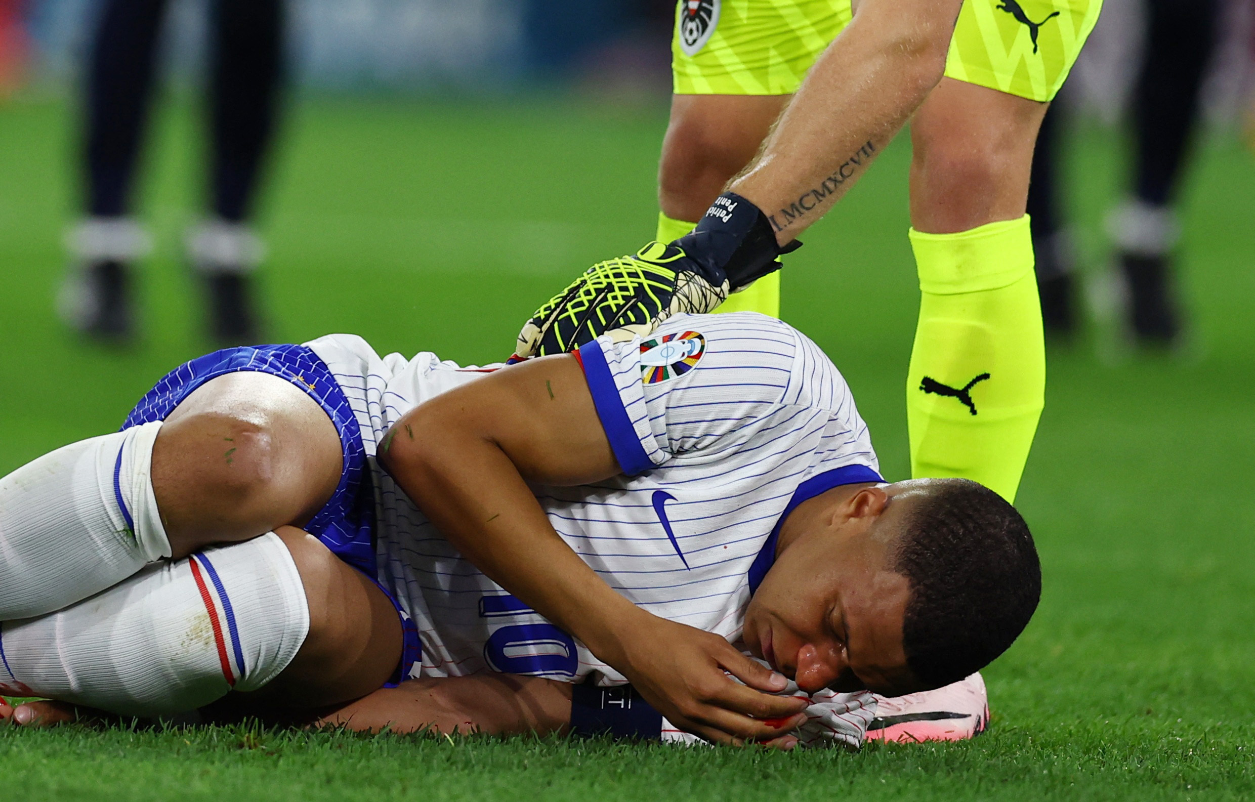 France battle past Austria but Mbappe suffers broken nose | Reuters